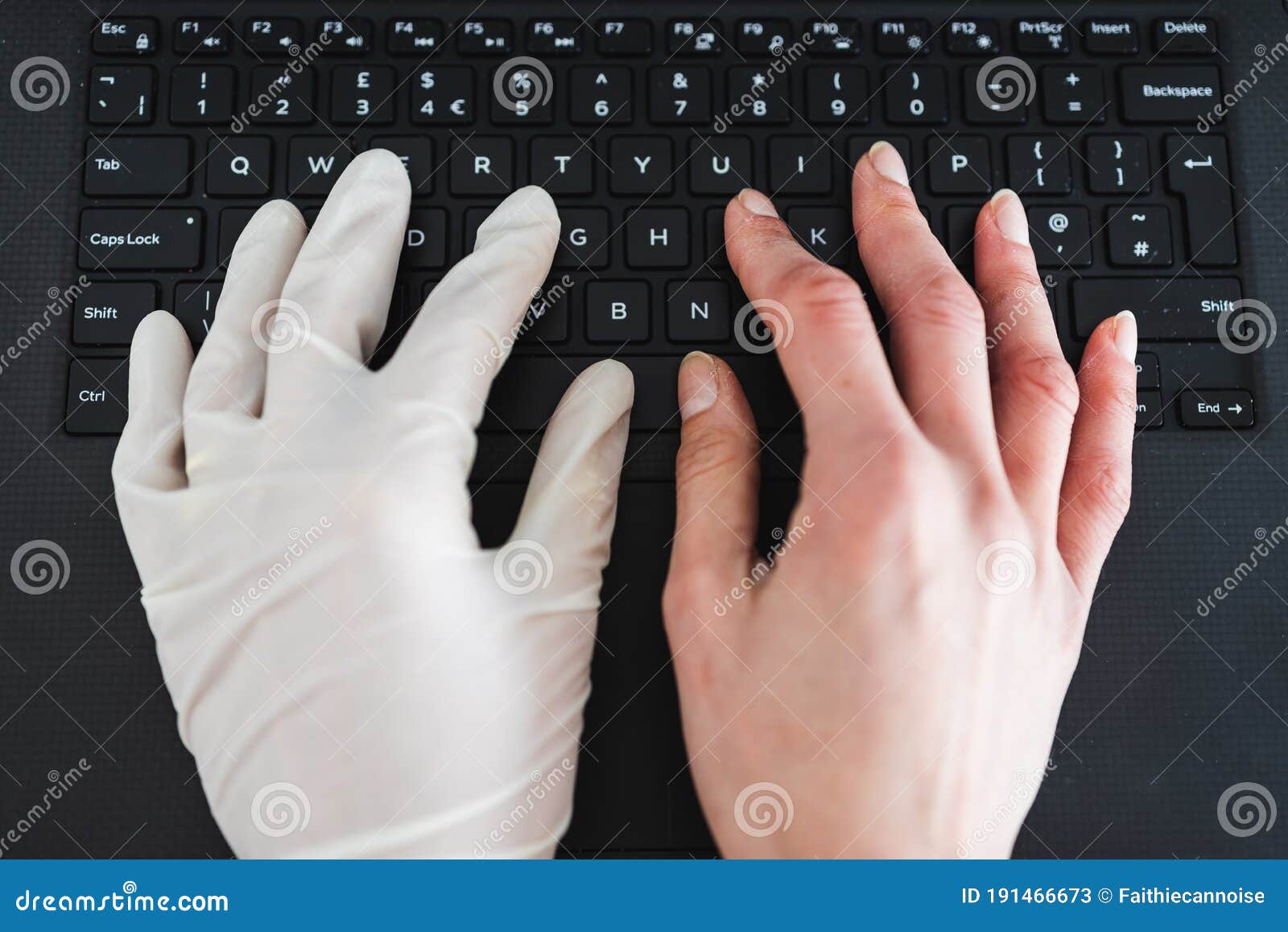 Hand Typing on Shared Computer Keyboard at Work Wearing Disposable ...