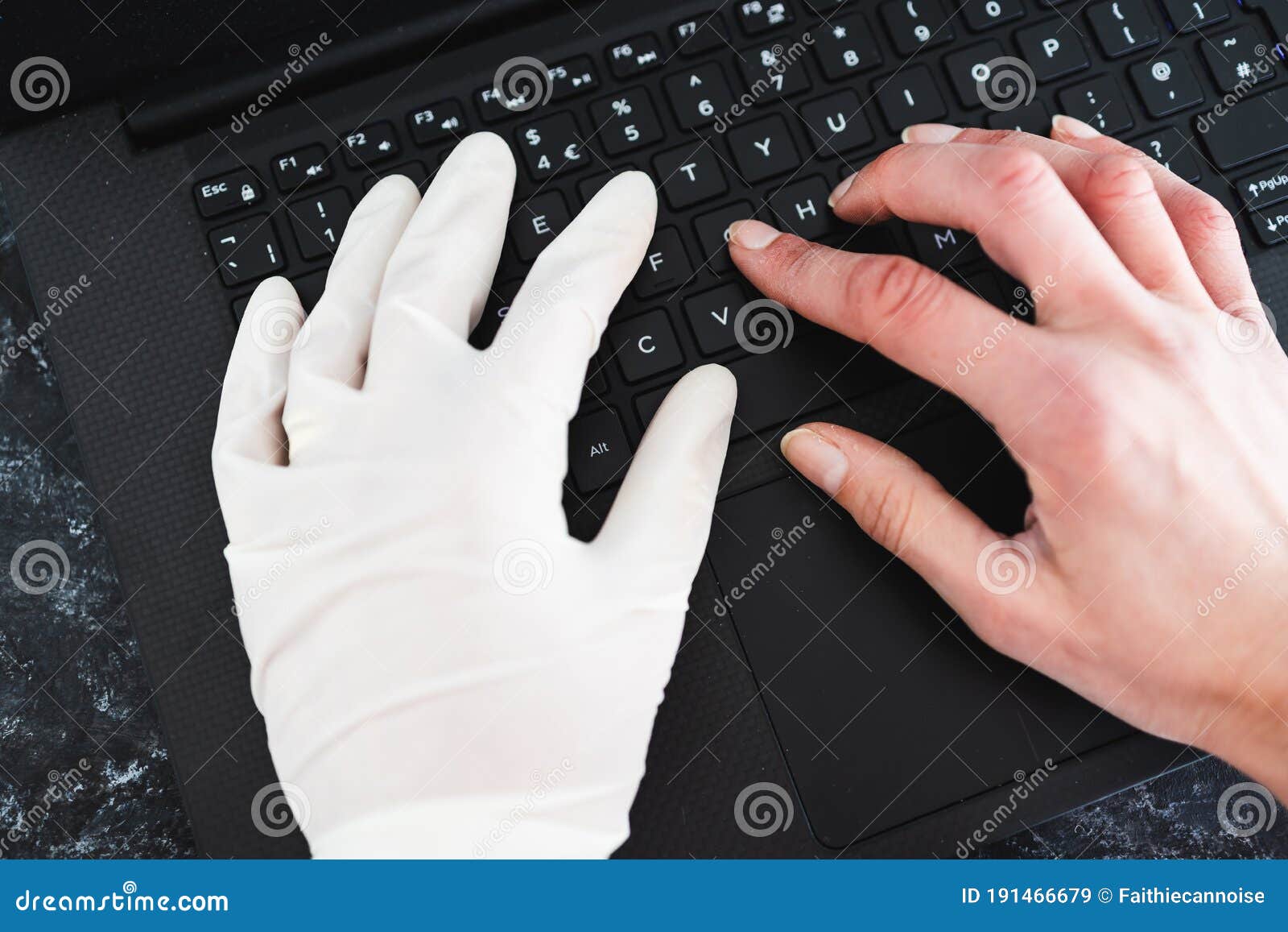 Hand Typing on Shared Computer Keyboard at Work Wearing Disposable ...