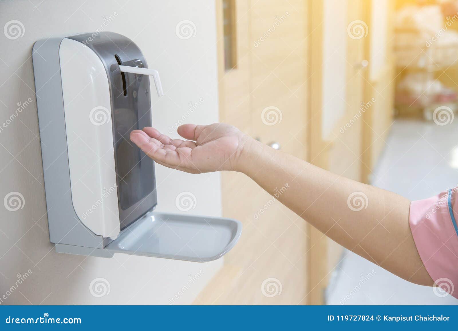 Hand Under the Automatic Alcohol Dispenser. Stock Photo - Image of ...