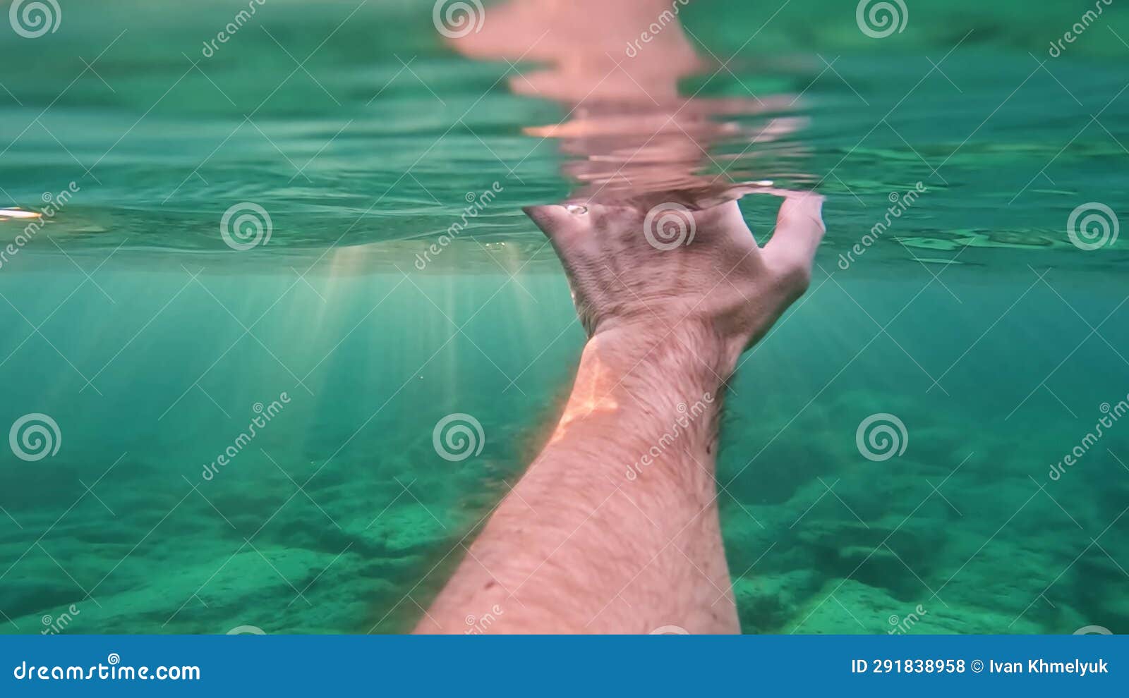 Hand Underwater Illuminated by Sun Rays Stock Footage - Video of touch ...