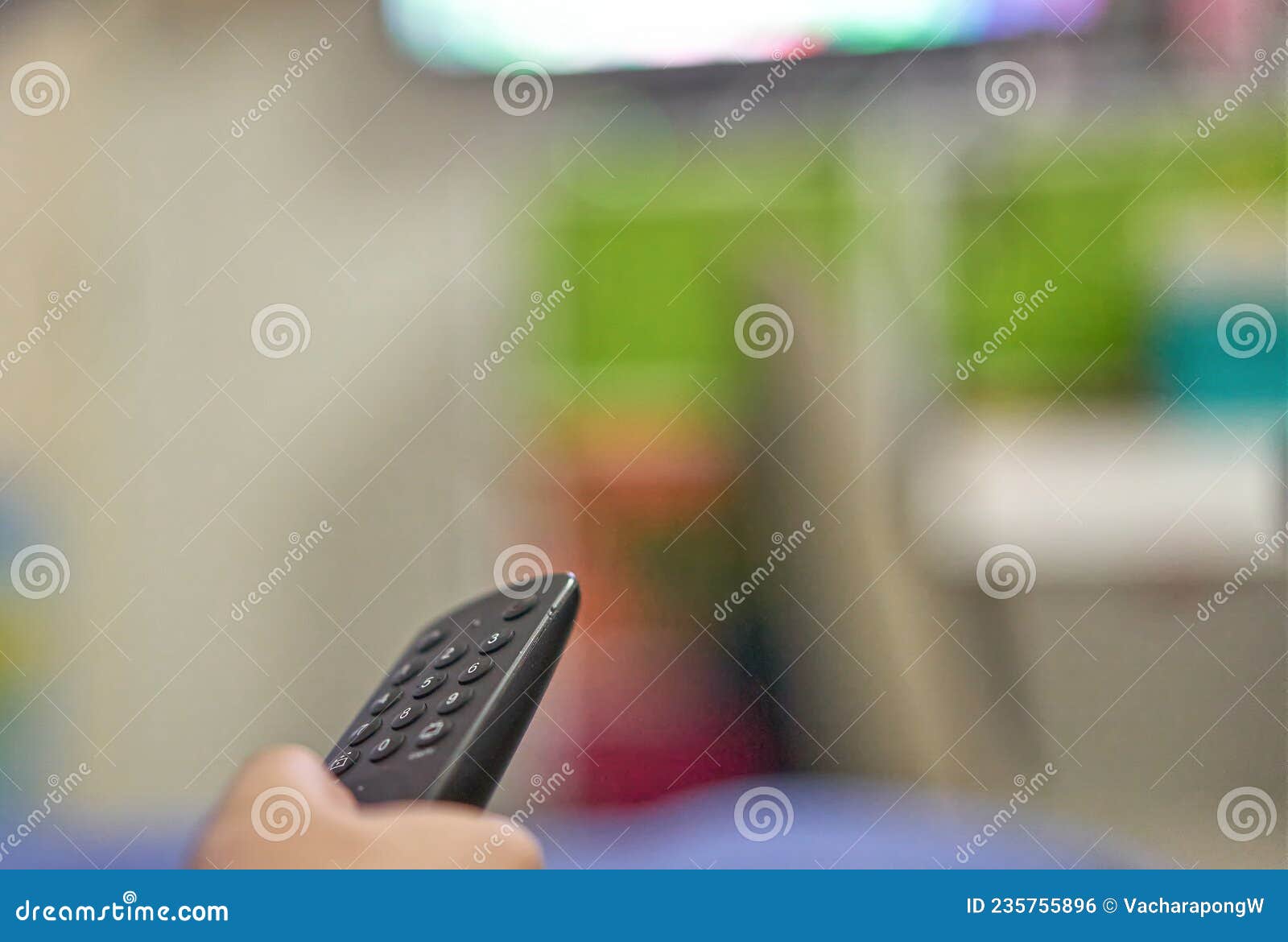 Hand Use Remote Control Tv for Change Channels in Living Room Stock ...