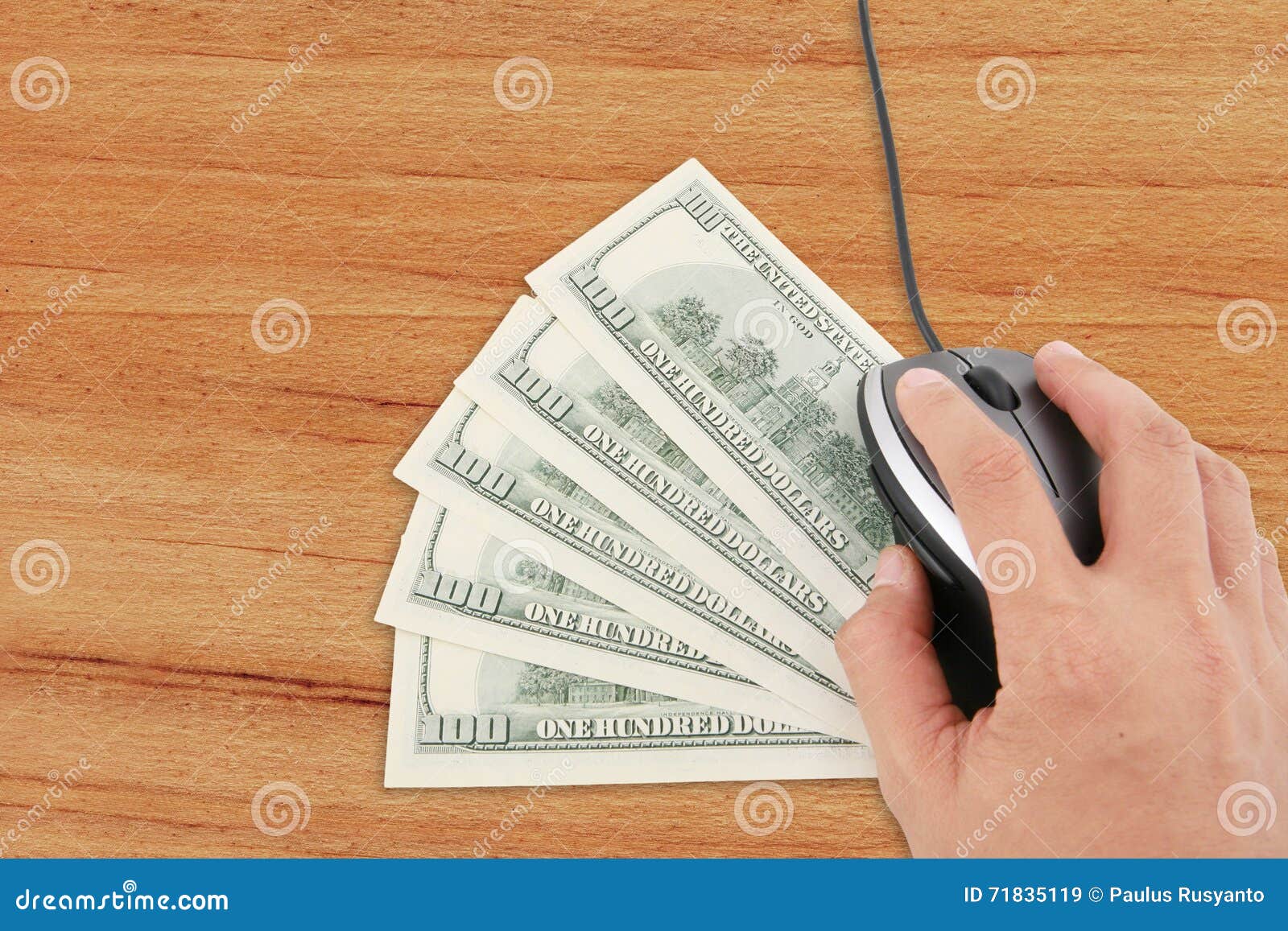 Hand Uses Computer Mouse with Money on Desk Stock Image - Image of ...