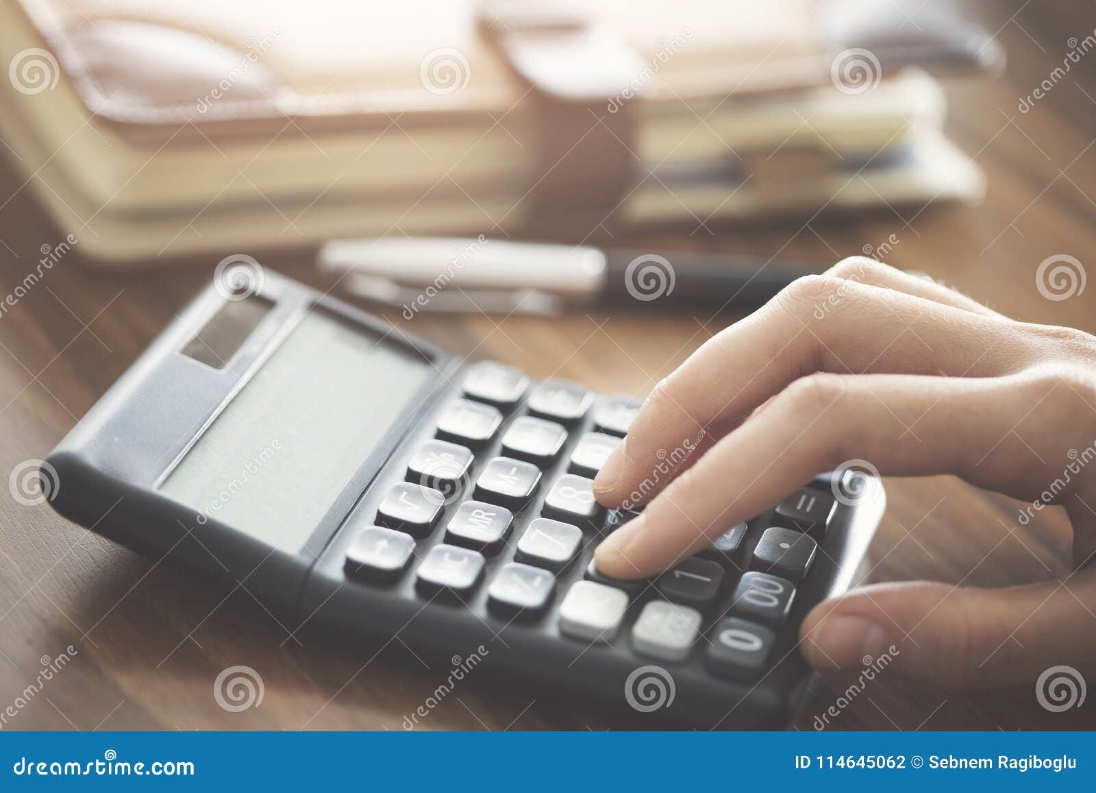 Hand Using Calculator on the Table Stock Photo - Image of invoice ...
