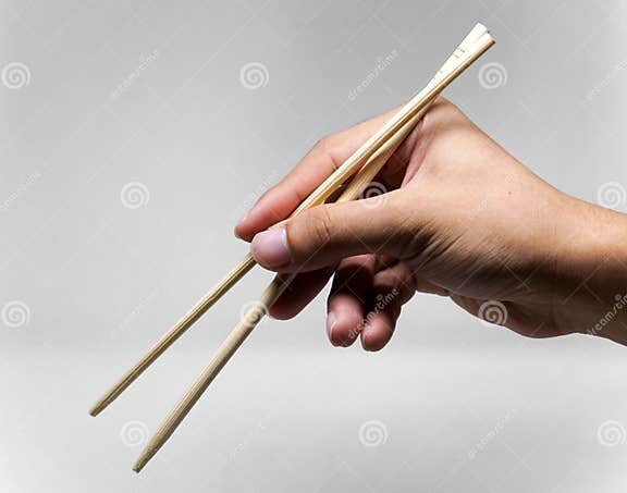 Hand using chopsticks stock photo. Image of open, gesture - 74298324