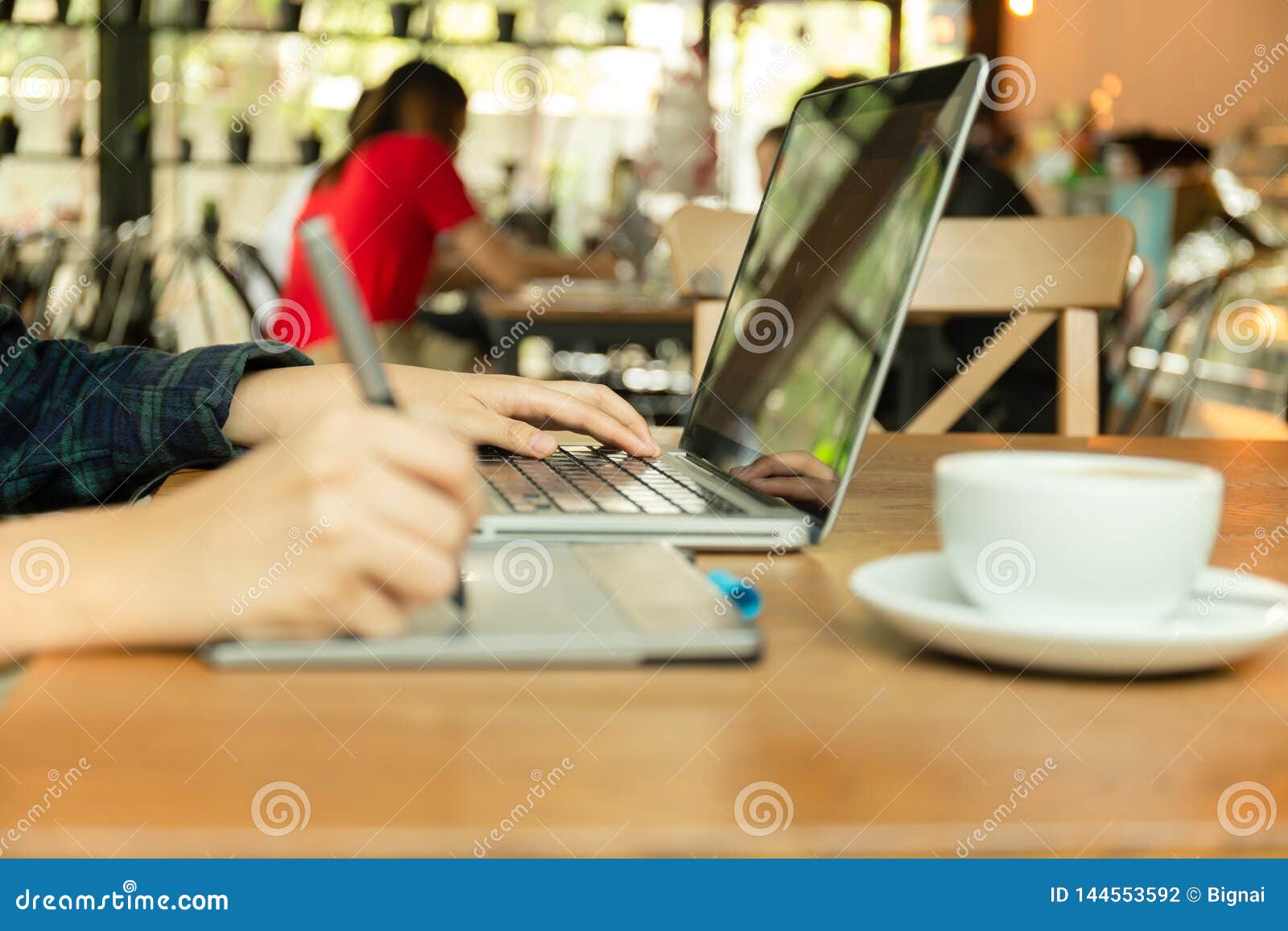 Hand Using Digital Tablet and Stylus Penand Working with Laptop ...