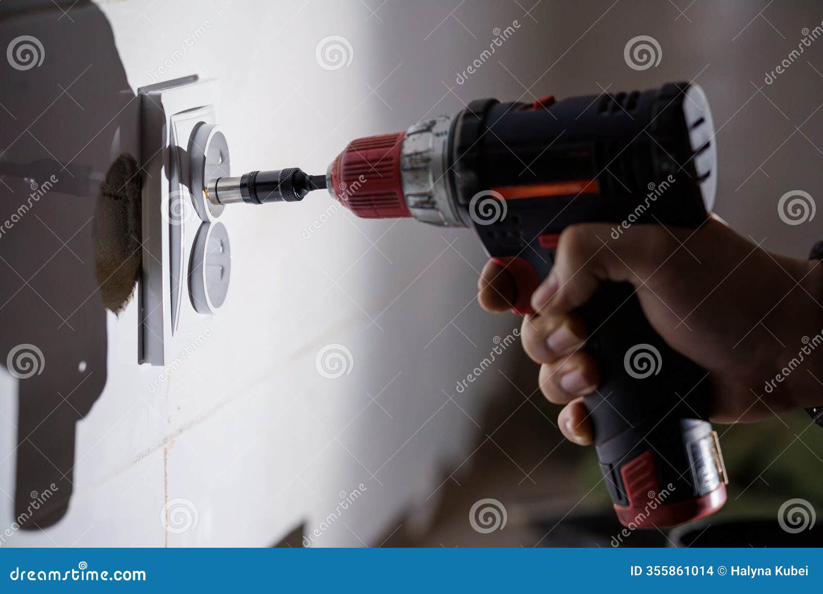 Hand Using Electric Screwdriver To Install Wall Socket Stock Photo ...