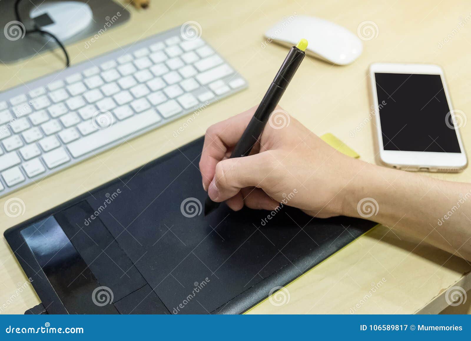 Hand Using Graphic Tablet with Smartphone on Desk Stock Image - Image ...