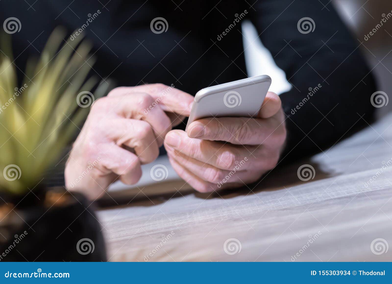 Hand using mobile phone stock photo. Image of device - 155303934