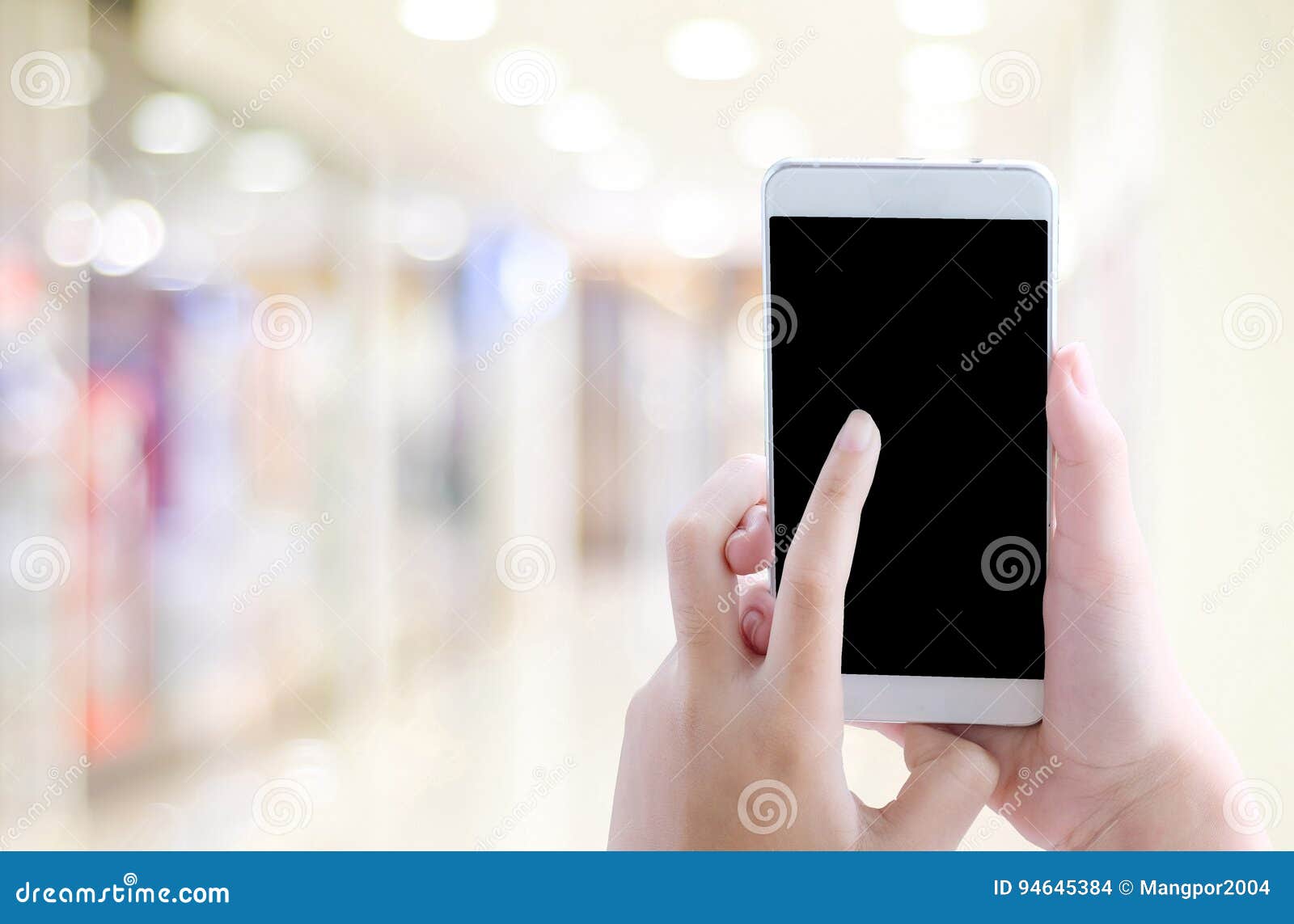 Hand Using Smart Phone with Blank Screen Over Blur Bokeh Light B Stock ...