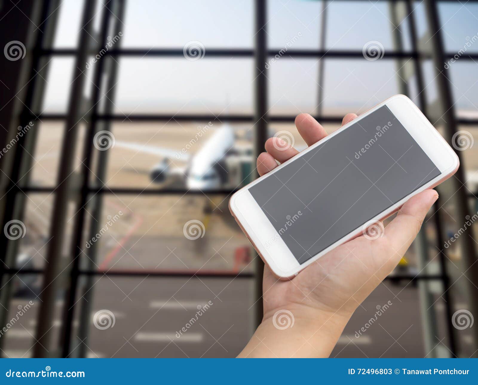 Hand Using Smartphone in Airport Gate. Stock Image - Image of ...