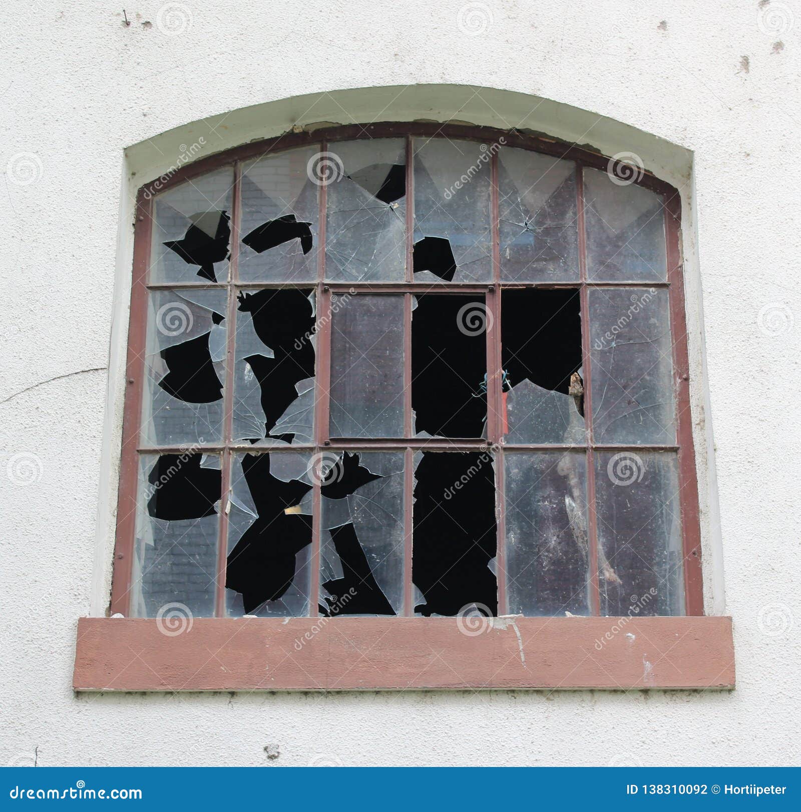 Broken Window with a Brown Frame Stock Photo - Image of crystals, frame ...