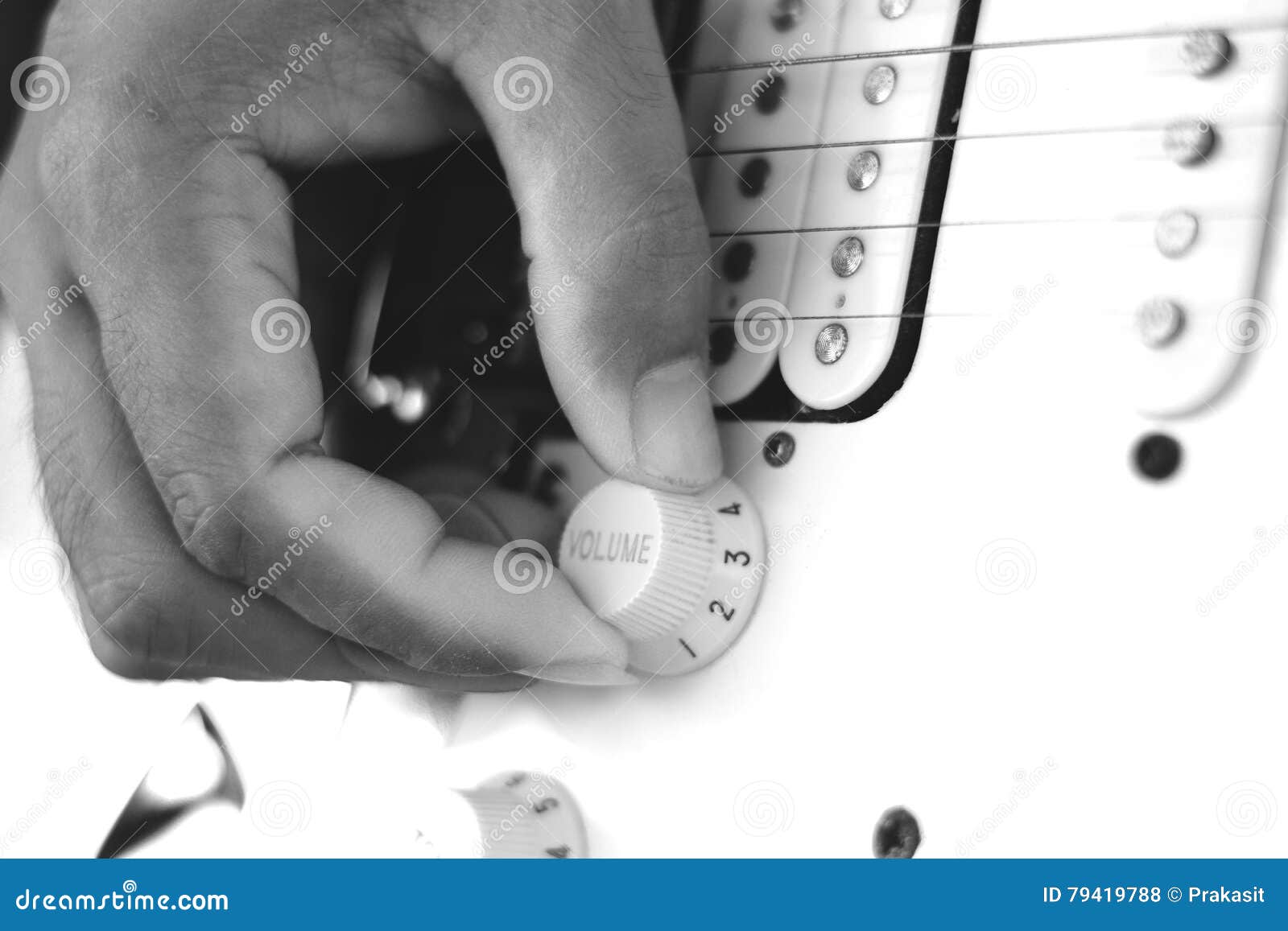 Hand on volume control stock photo. Image of distortion - 79419788