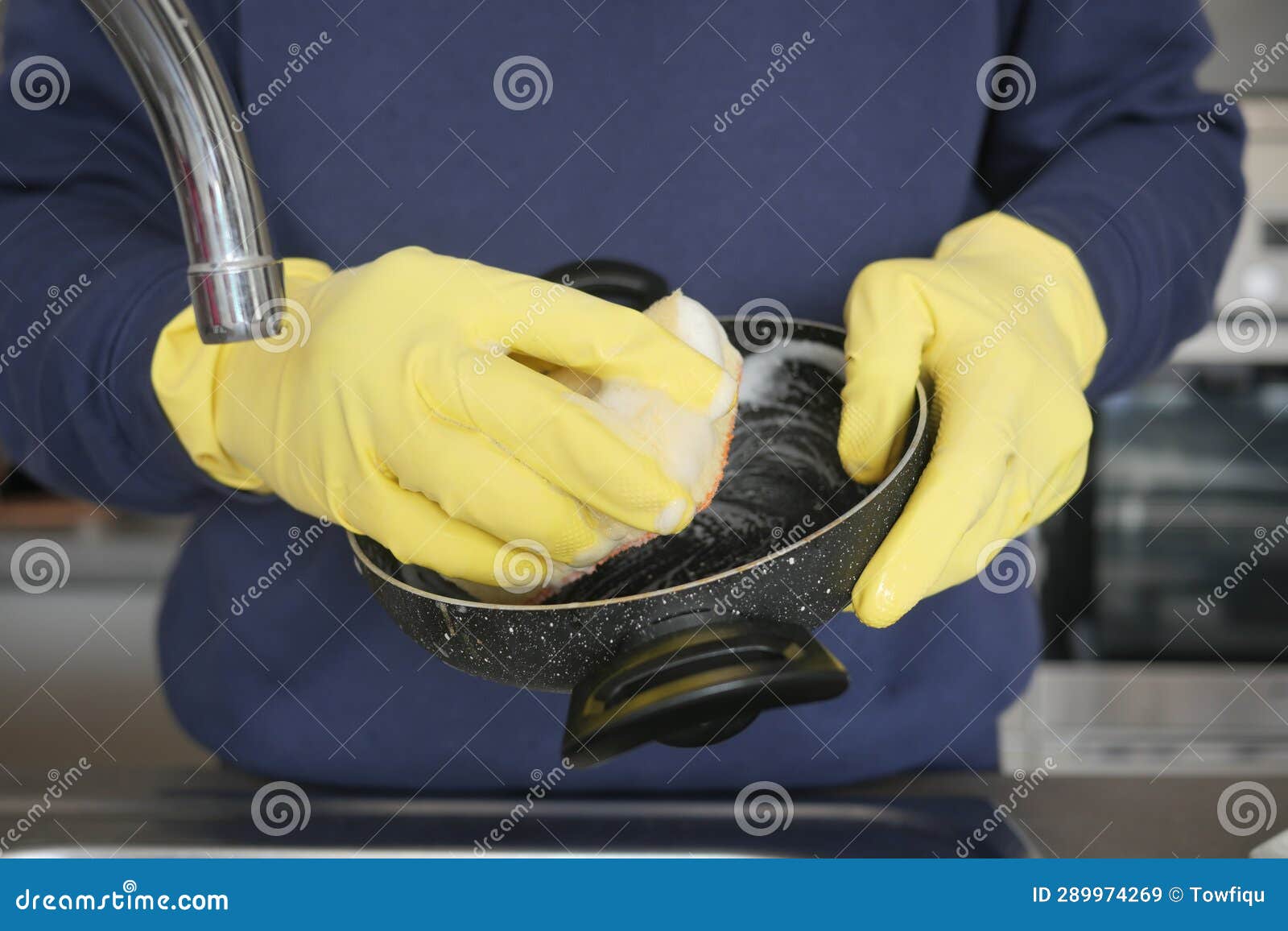 Hand washing a cooking pan stock image. Image of work - 289974269