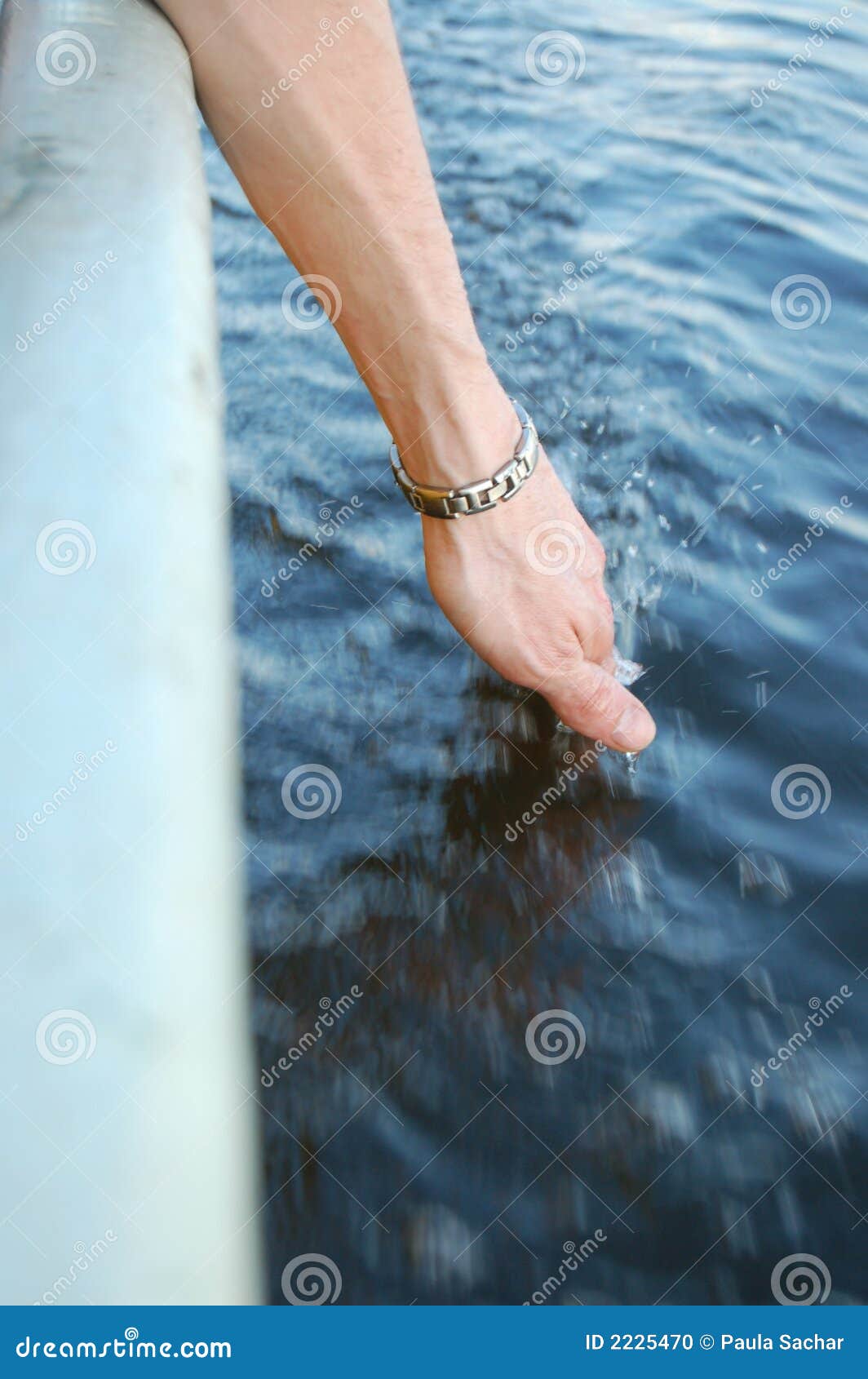 Hand in water stock photo. Image of boat, thumb, bracelet - 2225470
