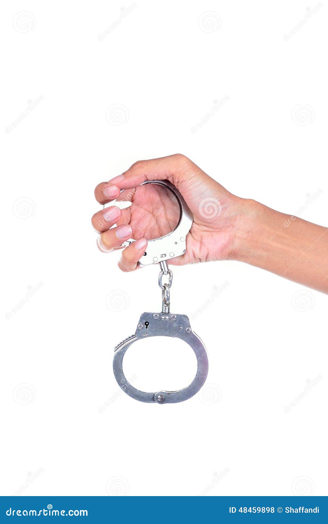 Hand wearing handcuffs stock photo. Image of prison, execute - 48459898