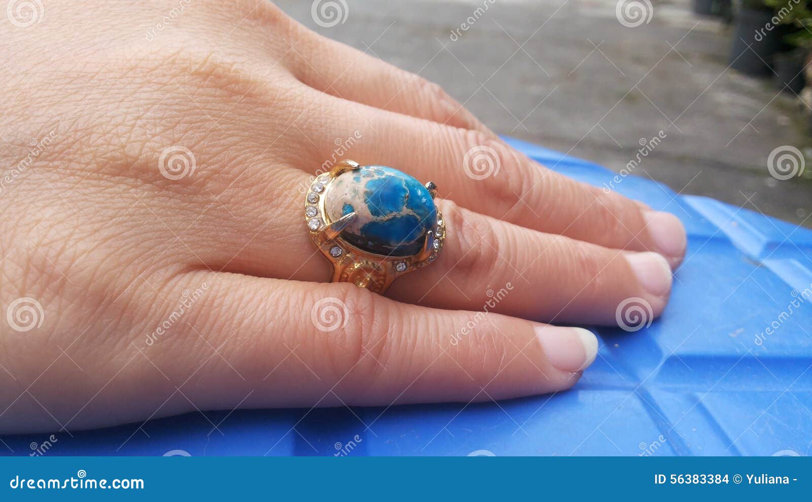 Hand wearing ring stock photo. Image of gold, gemstone - 56383384