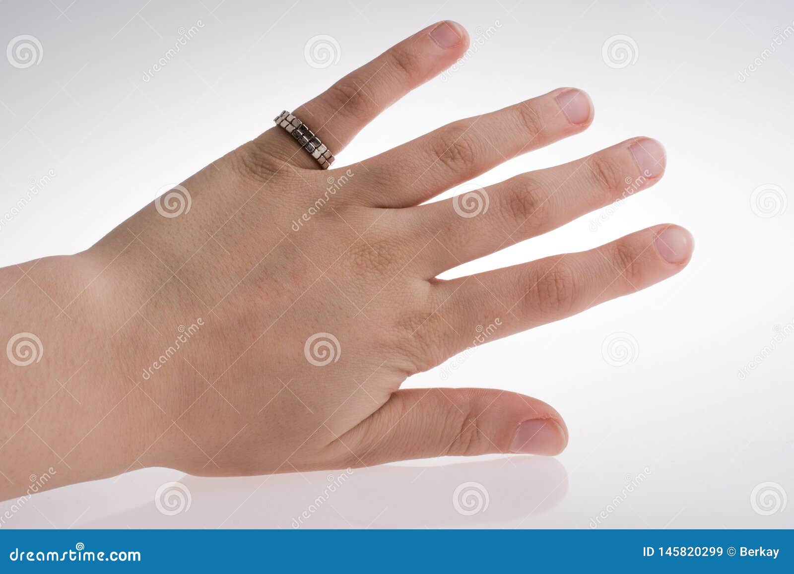 Hand wearing a ring stock image. Image of concept, holding - 145820299