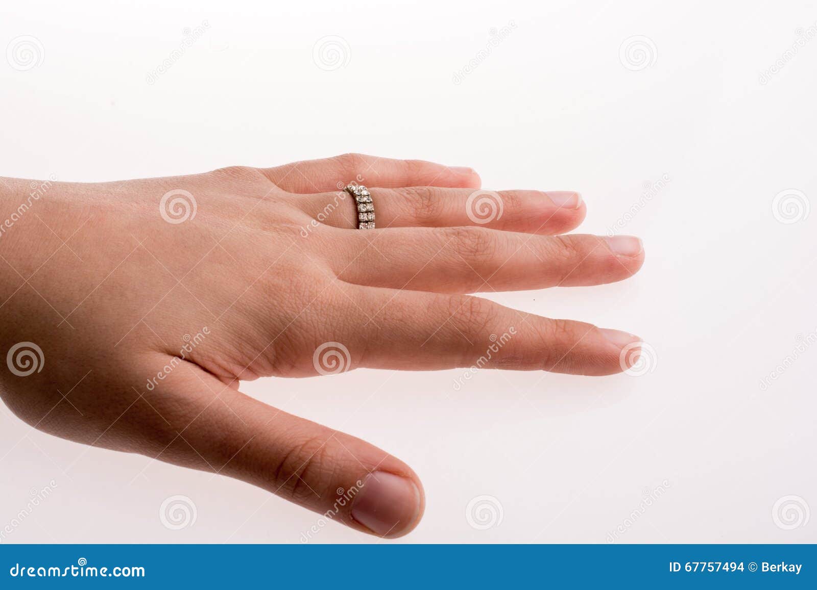 Hand wearing a ring stock photo. Image of diamond, isolated - 67757494