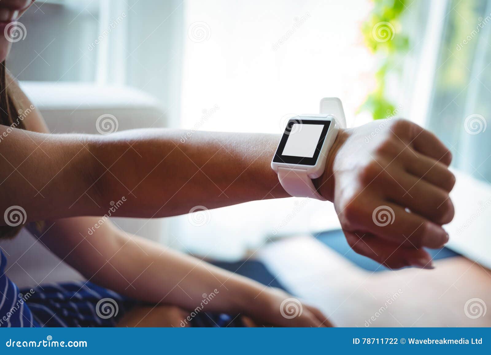 Hand wearing smart watch stock photo. Image of information - 78711722