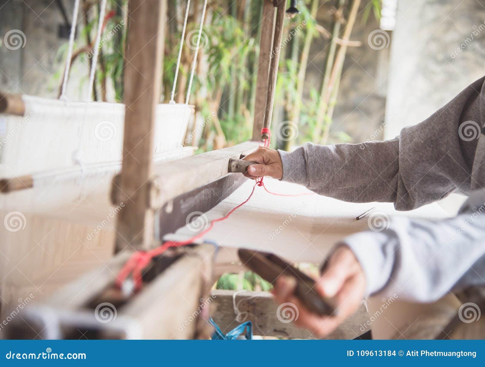 The Hand of a Weaver is Woven with a Hand-woven Machine Stock Photo ...