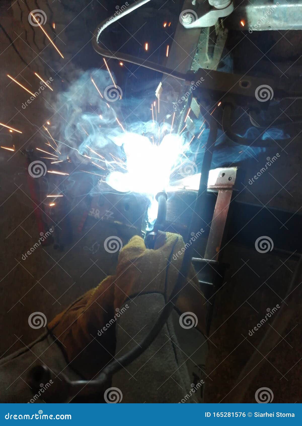 Hand with a Holder from Argon Welding in the Process Stock Photo ...
