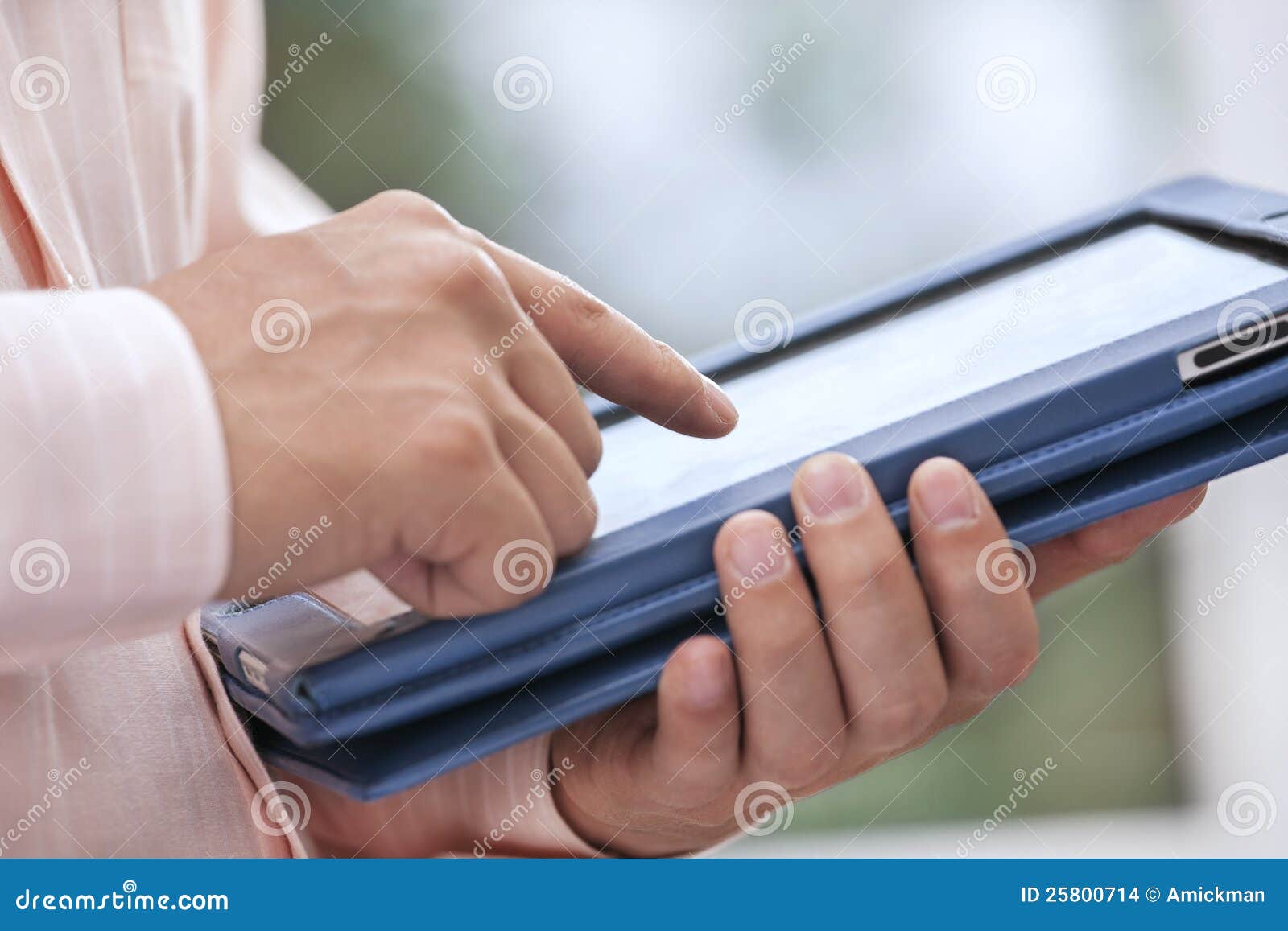 Hand wih digital tablet stock photo. Image of indoors - 25800714