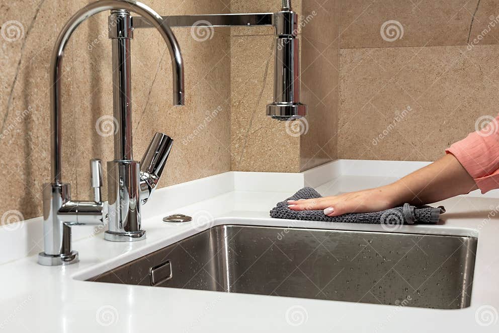 Hand Wipes the Surface of the Table in the Kitchen with a Dry Rag Stock ...