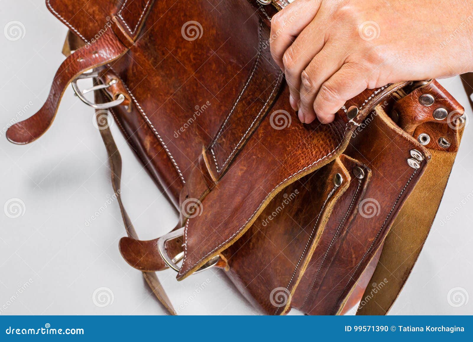 The Hand Holds a Leather Briefcase Stock Photo - Image of fashioned ...