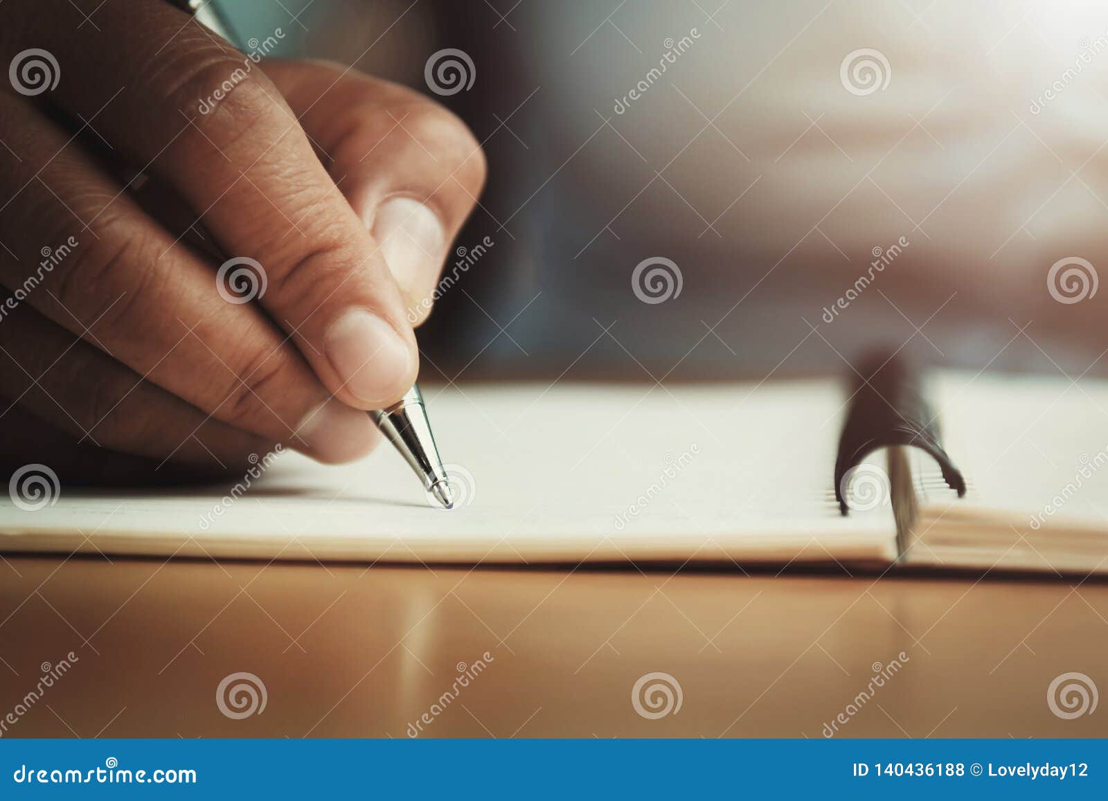 Hand of Woman Holding Pen with Writing on Notebook Stock Photo - Image ...