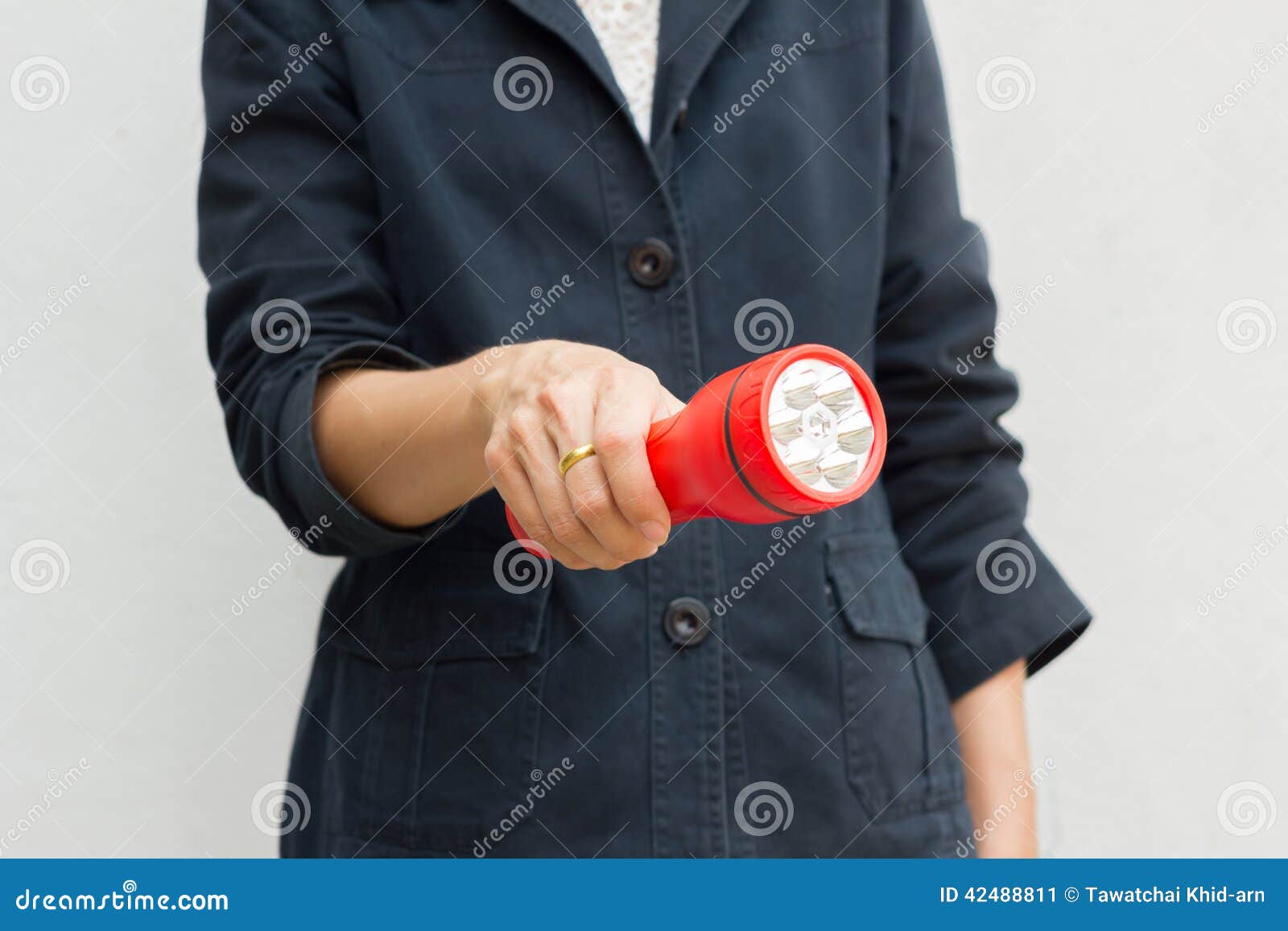 Hand of Woman Holding Red Flashlight Stock Image - Image of electronics ...