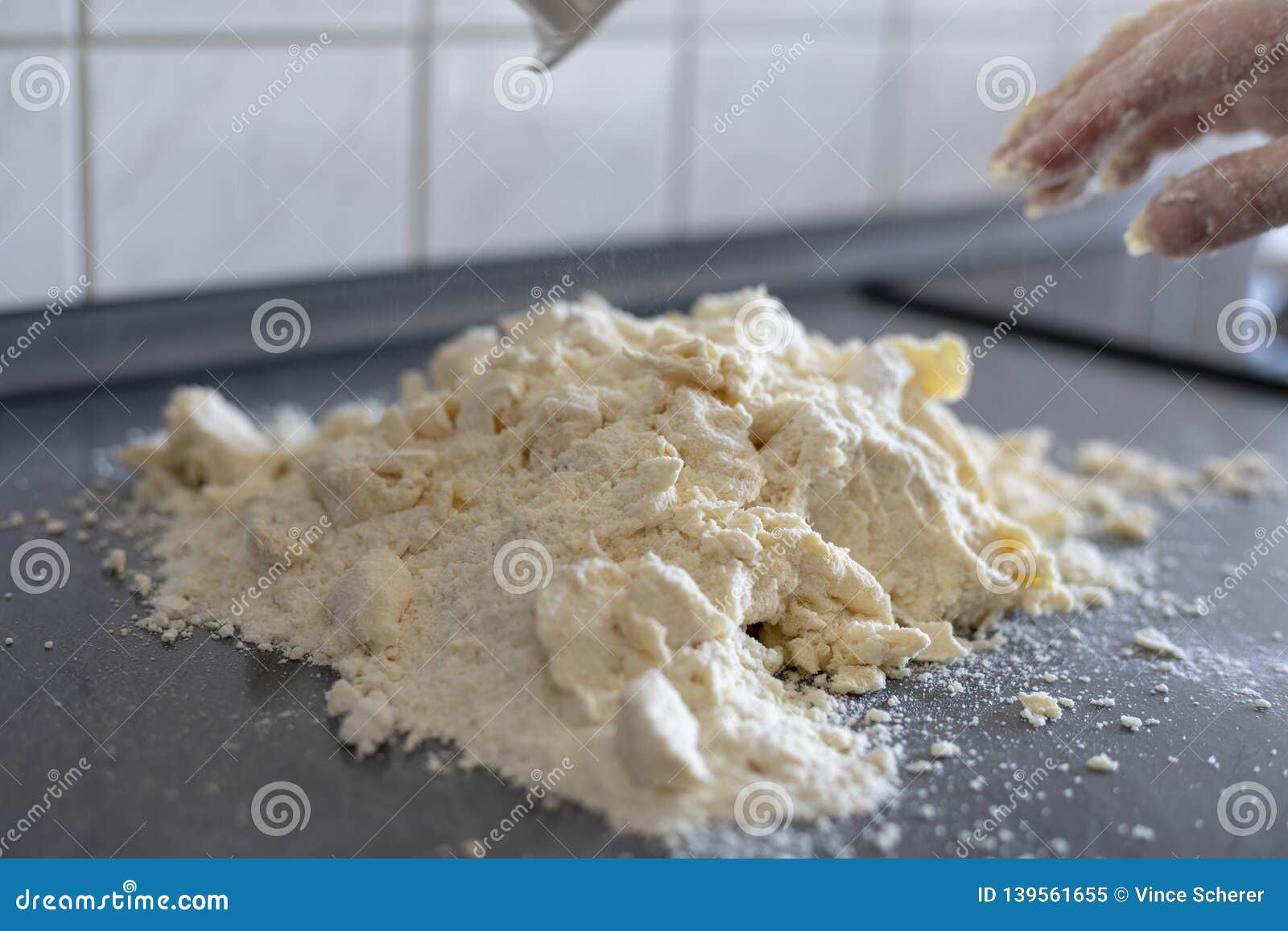 Hand of Woman Kneading Dough for a Cake on Grey Table Stock Image ...