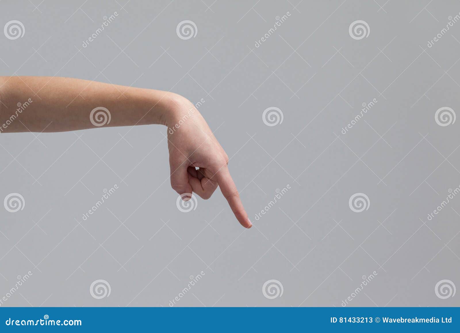 Hand of a Woman Pointing Downwards Stock Image - Image of closeness ...