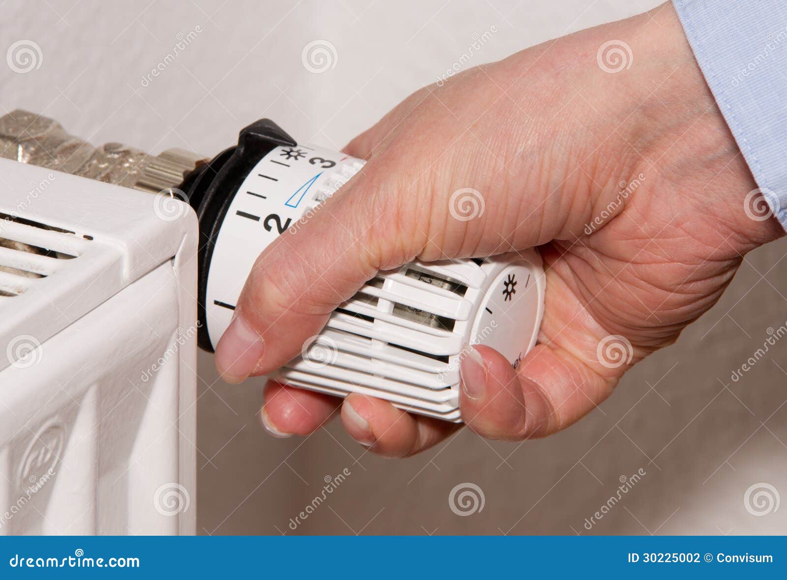 Hand Turning Radiator Control Stock Photo - Image of single, turning ...