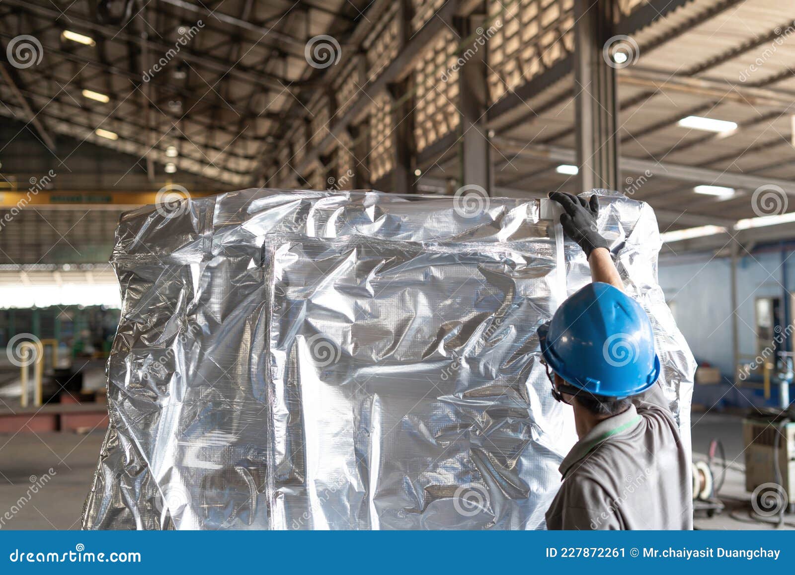 Hand a Worker Check Plastic Wrapping and Plastic Strap on Product for ...