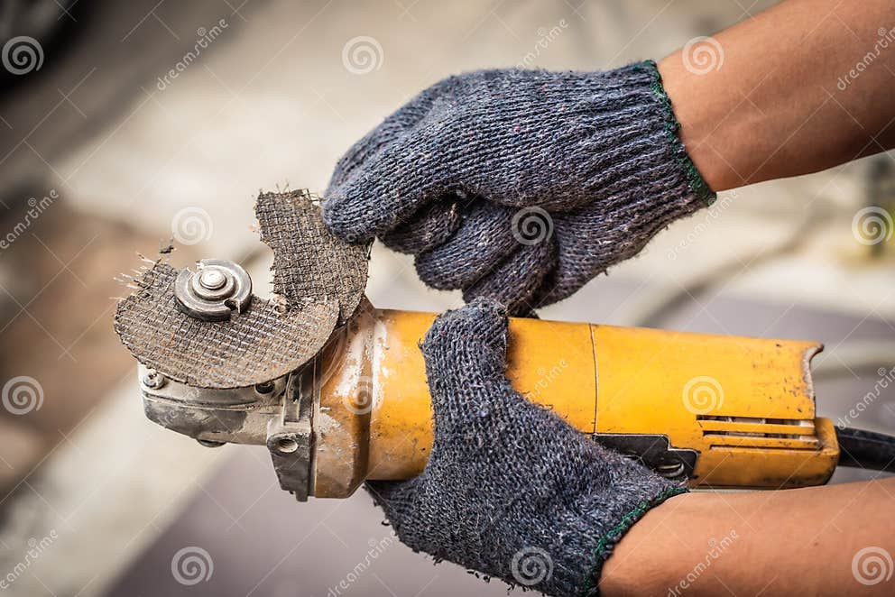 Hand of Worker Man Hold Grinder Blades Broken . Dangers of Using Stock ...