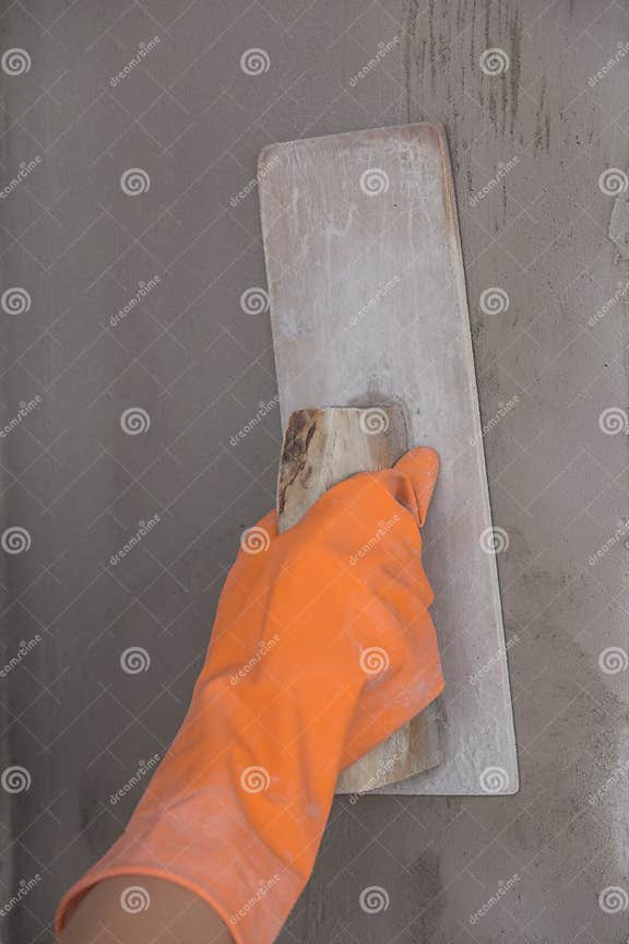 Hand of Worker Use Trowel Plastering Concrete at Wall Stock Photo ...