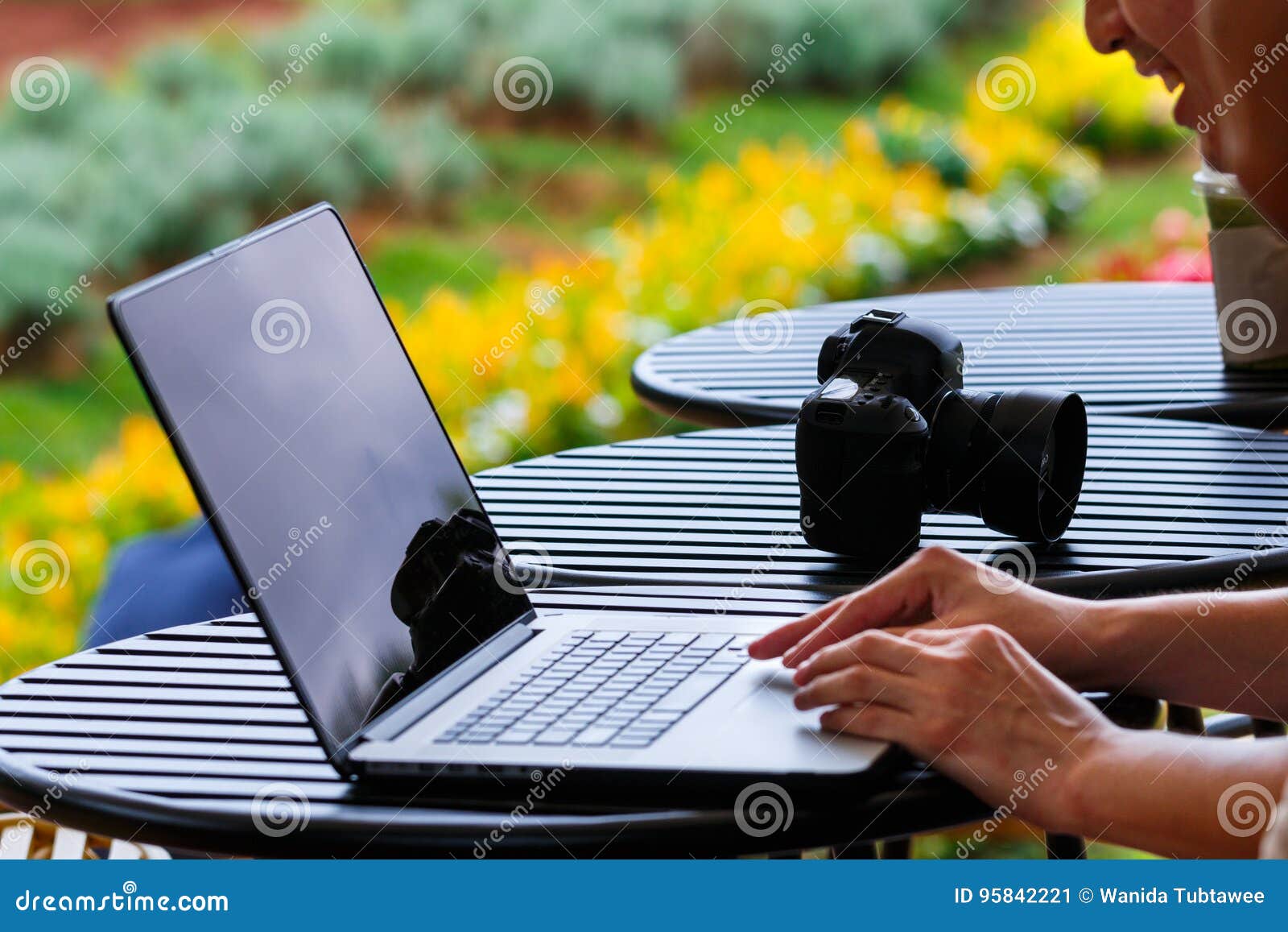 Hand Working on Notebook in the Flower Garden. Stock Image - Image of ...