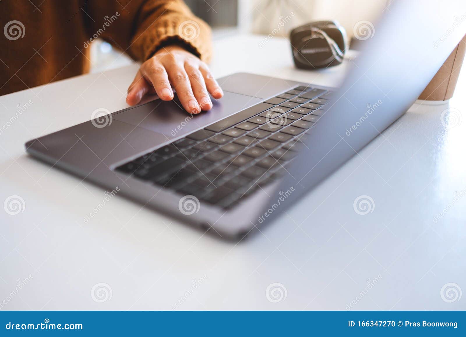 Hand Working and Touching on Laptop Touchpad on the Table Stock Photo ...