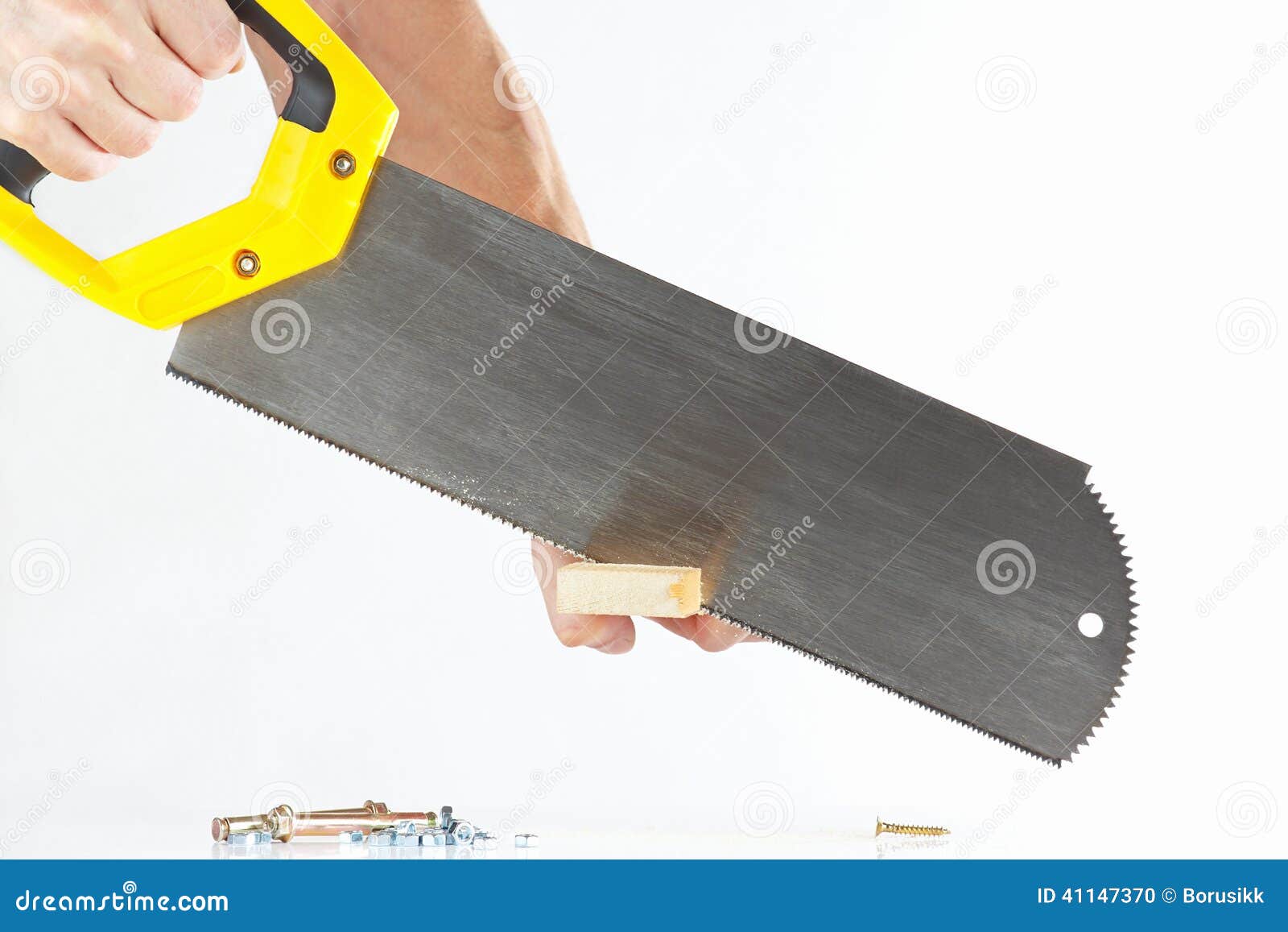 Hand Of Workman Sawing Wooden Block With Hacksaw Stock Photography ...