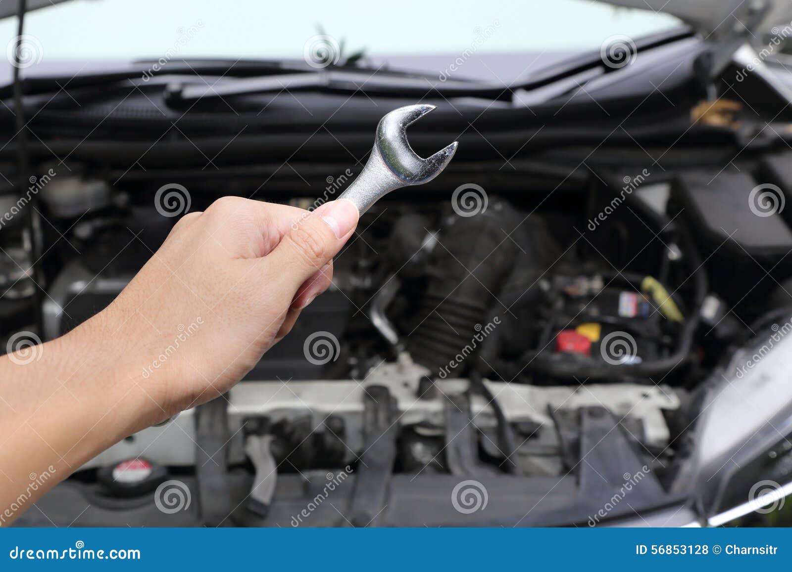 Hand with Wrench on Car Engine Stock Photo - Image of blue, profession ...