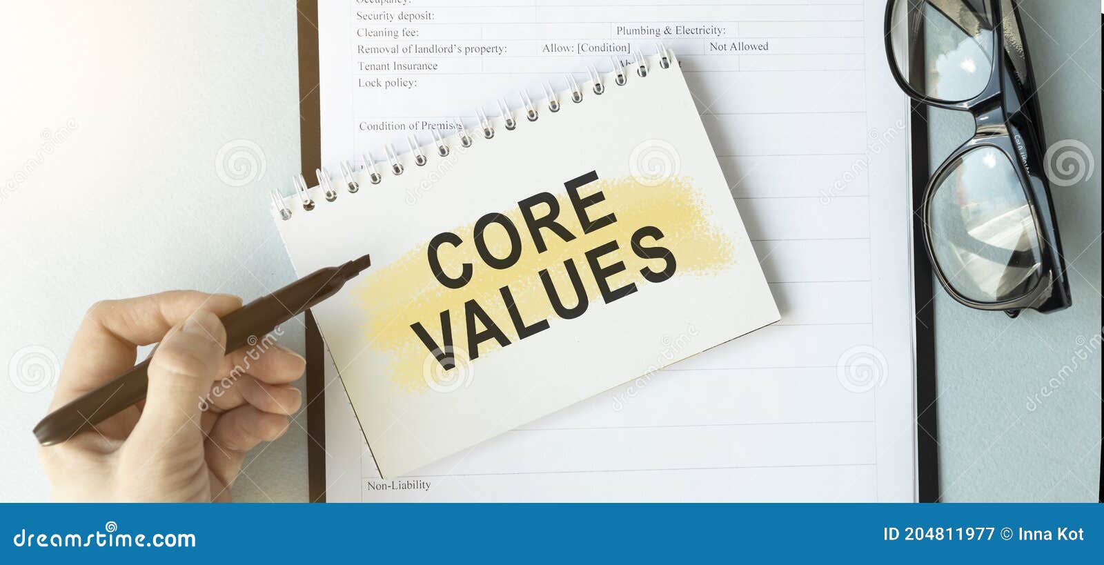 Hand Writes a Note on a CORE VALUES Notebook Stock Image - Image of ...