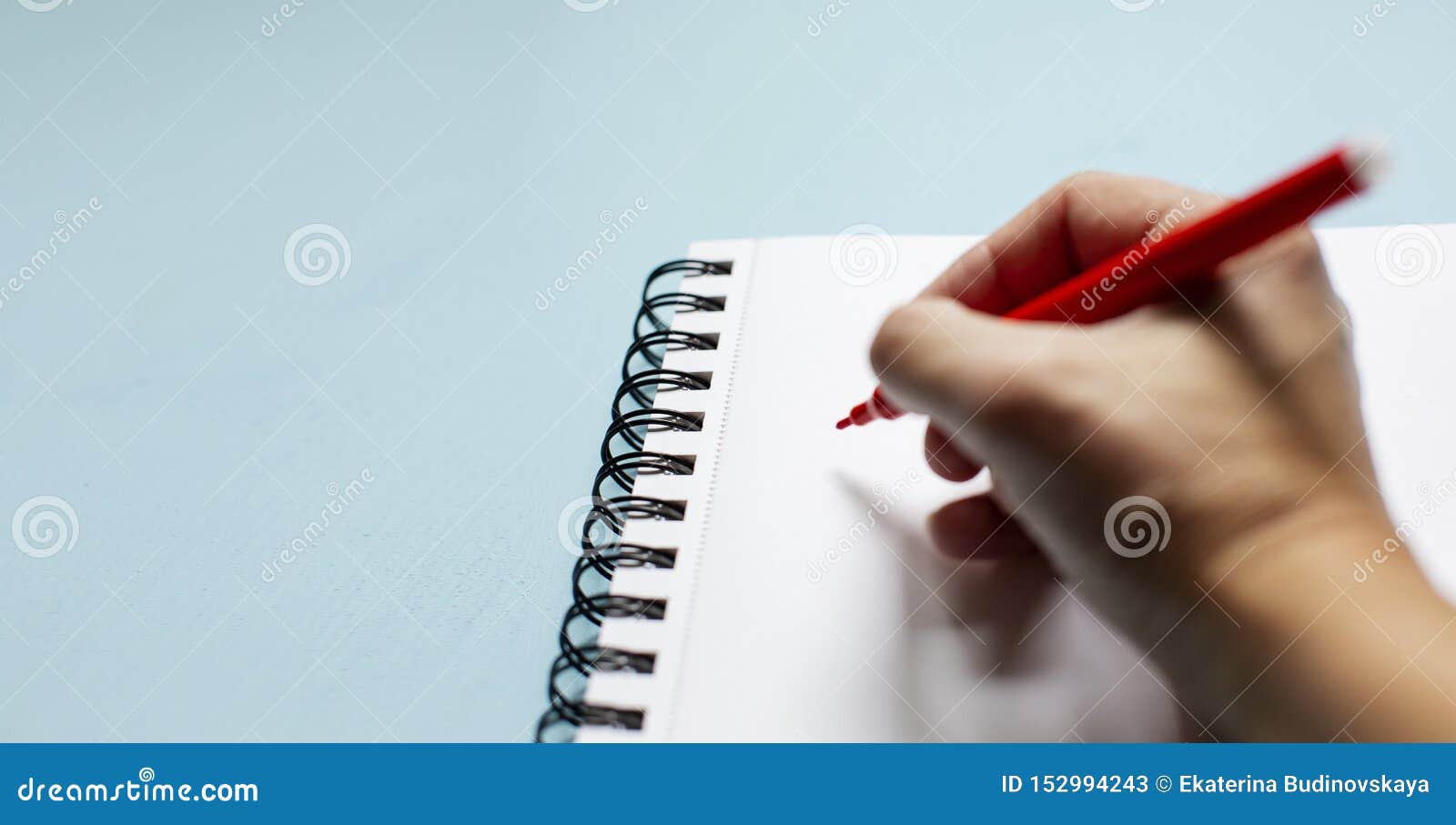 Hand writes the text stock image. Image of education - 152994243