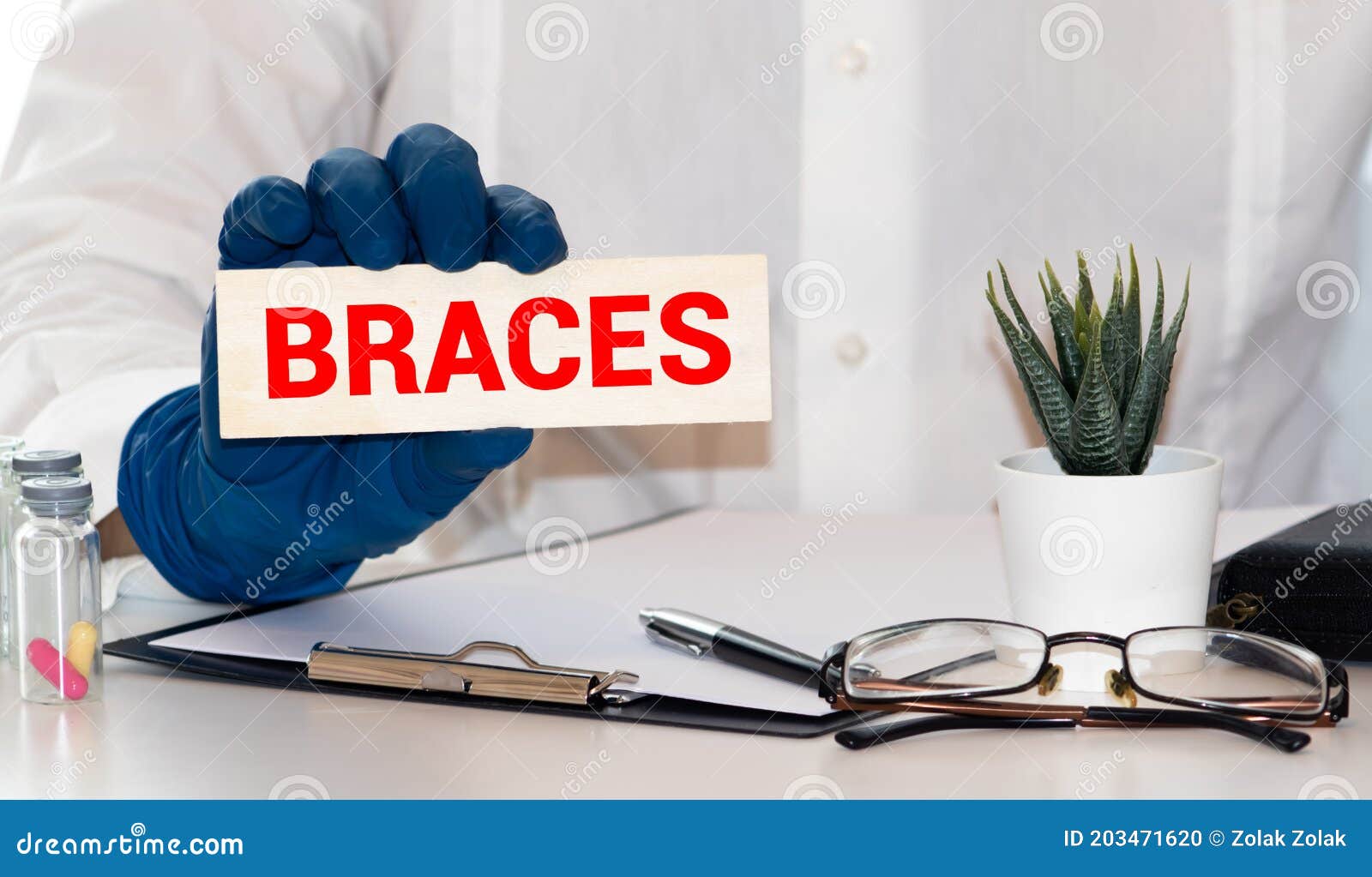 Hand Writing BRACES with the Abstract Background Stock Photo - Image of ...
