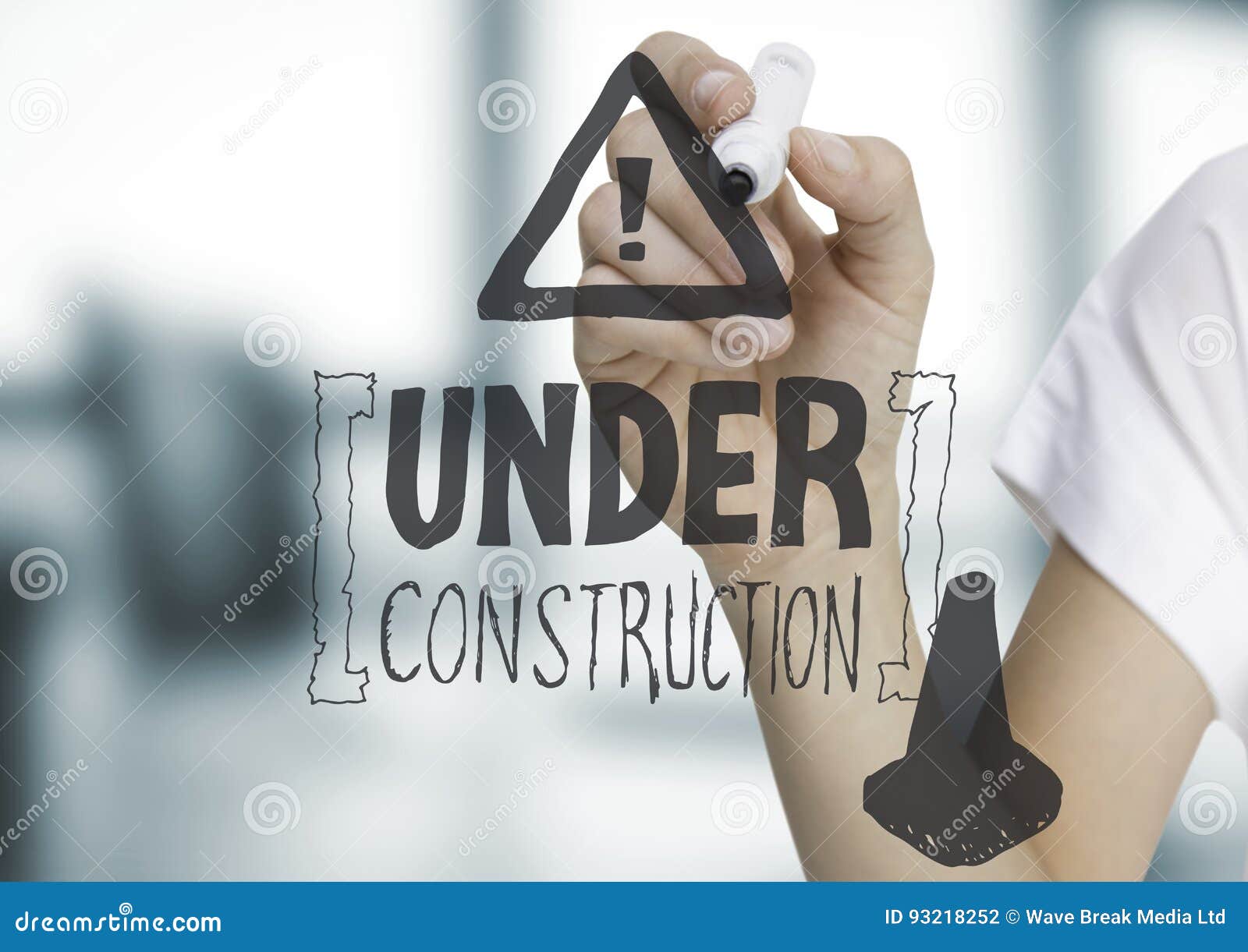 Hand Writing Construction Doodle in Blurry Grey Office Stock Photo ...