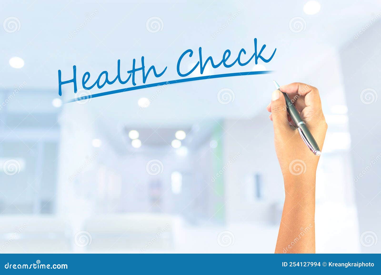 Hand Writing Health Check and Hospital Blurry Background Stock Photo ...