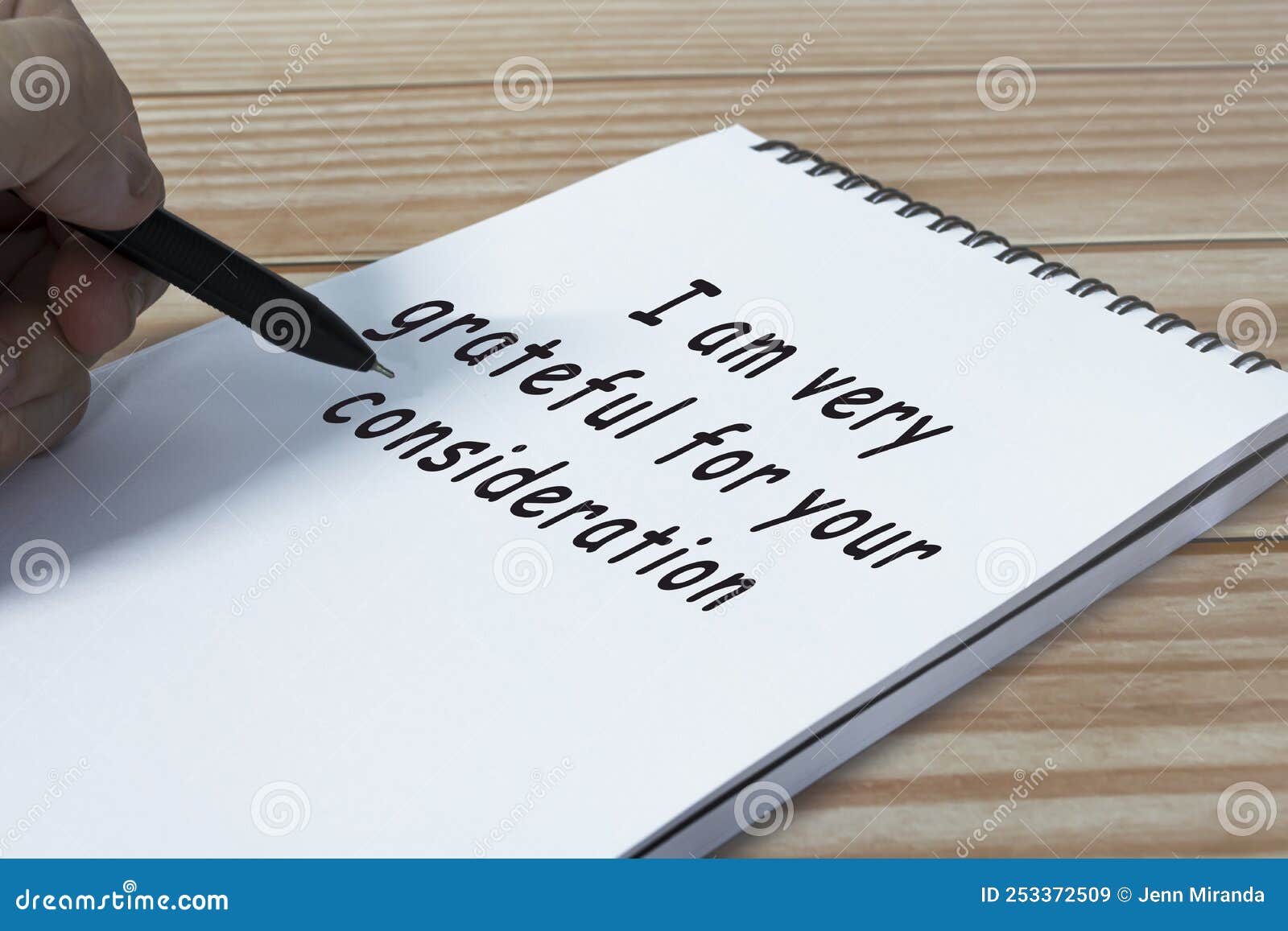 Hand Writing I am Very Grateful for Your Consideration Text on Notepad ...