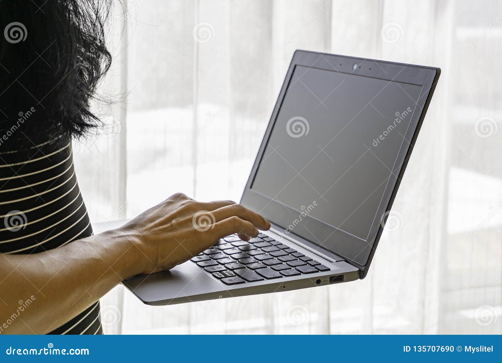 A Hand Writing on a Laptop Keyboard Stock Photo - Image of person ...
