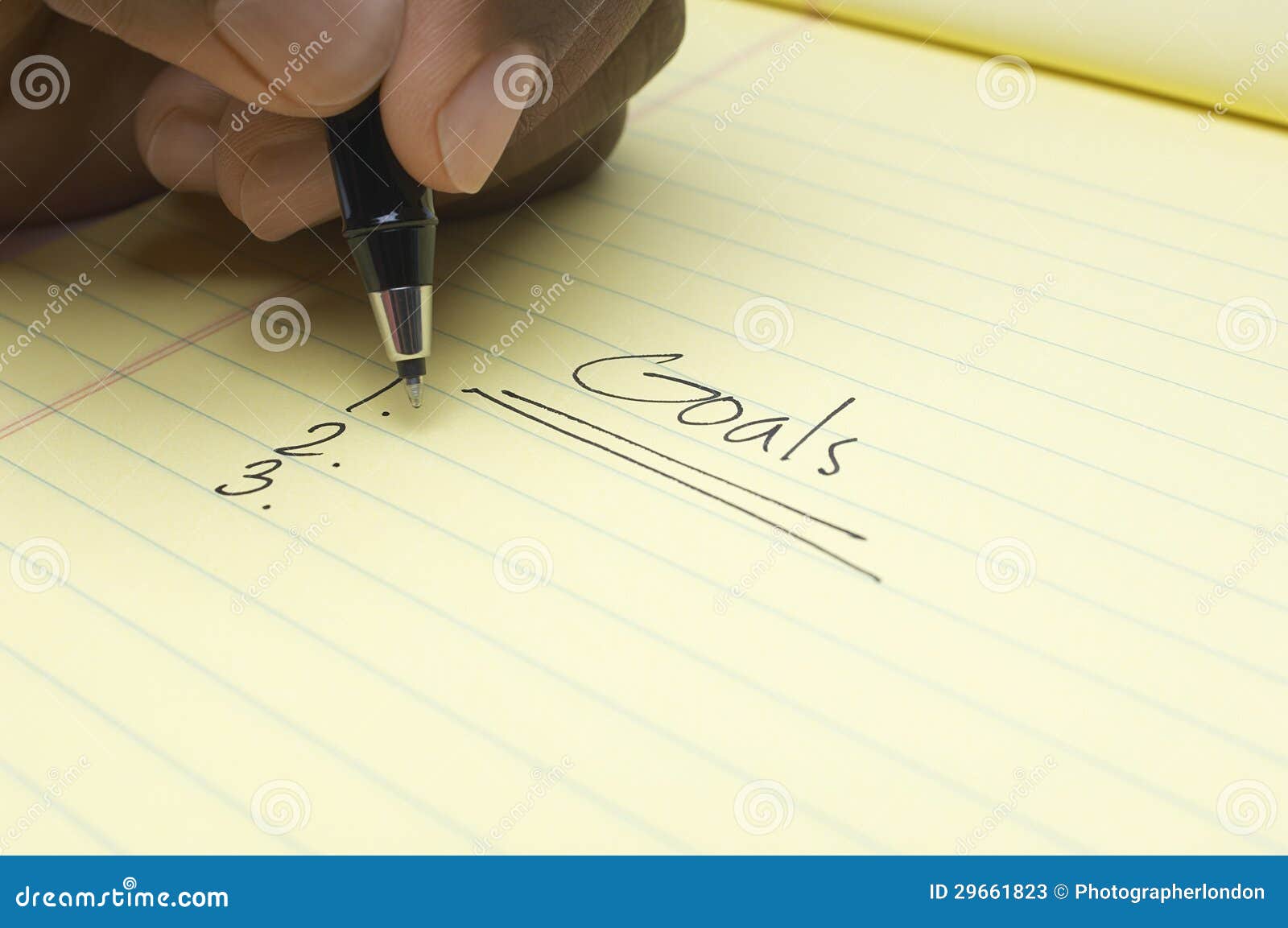 Hand Writing List of Goals on Notepad Stock Image - Image of cropped ...