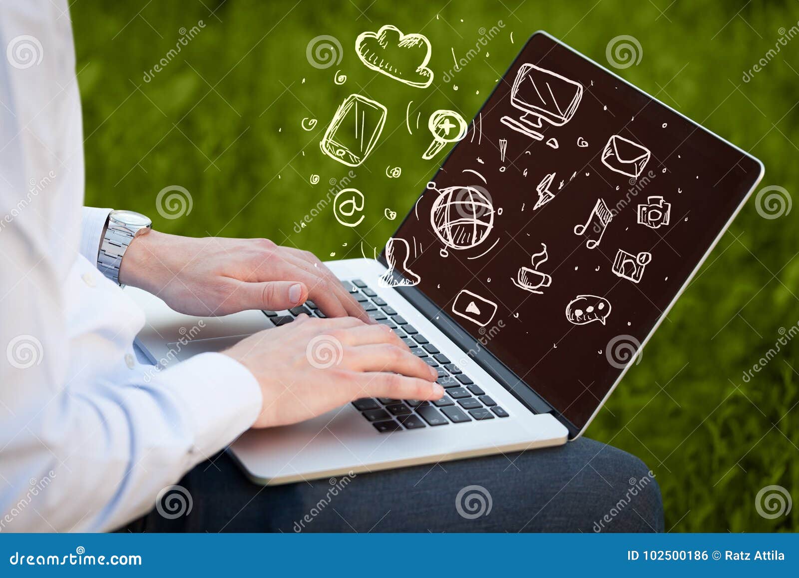 Hand Writing on Notebook Computer with Media Icons Stock Photo - Image ...