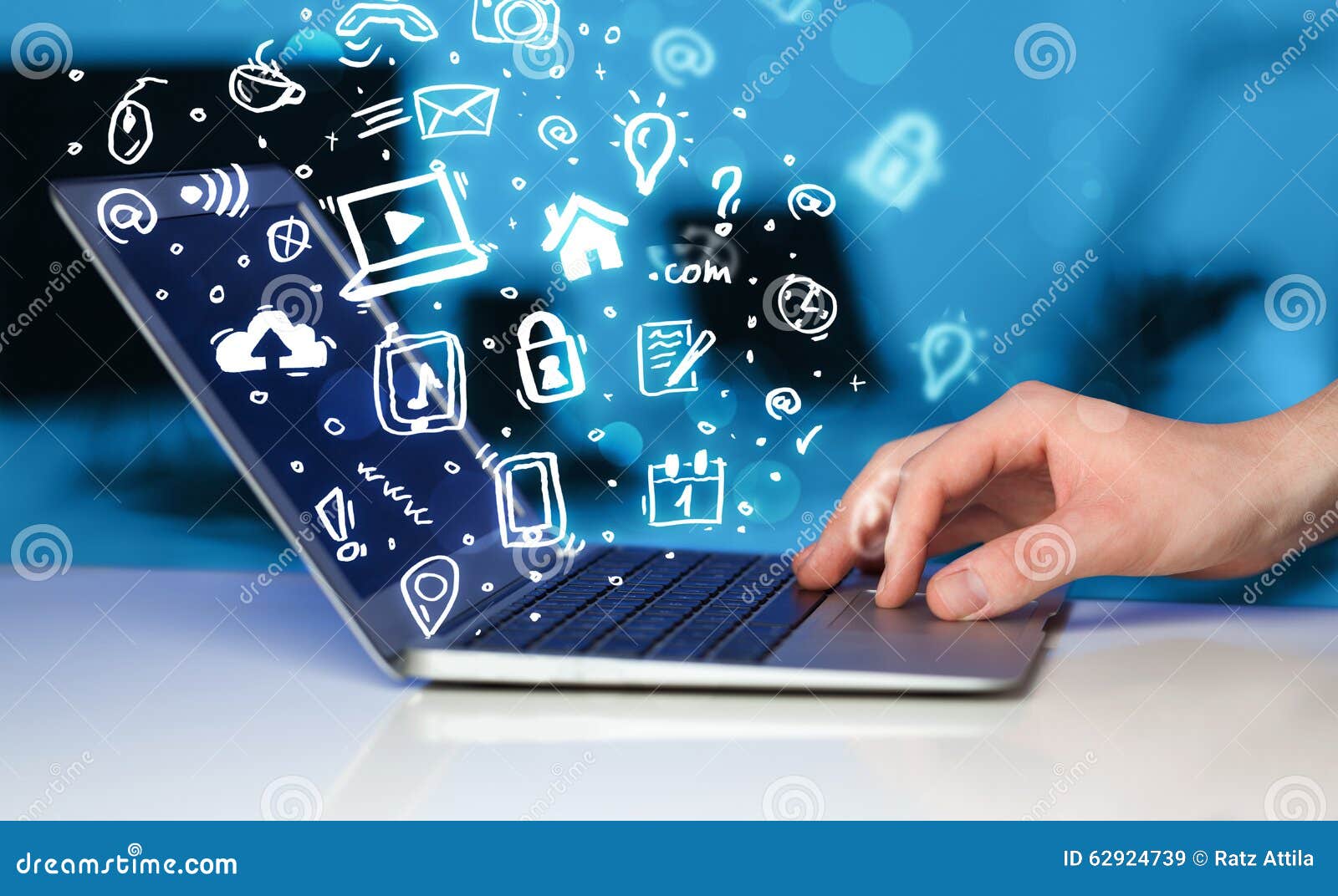 Hand Writing On Notebook Computer With Media Icons And Symbols Royalty ...